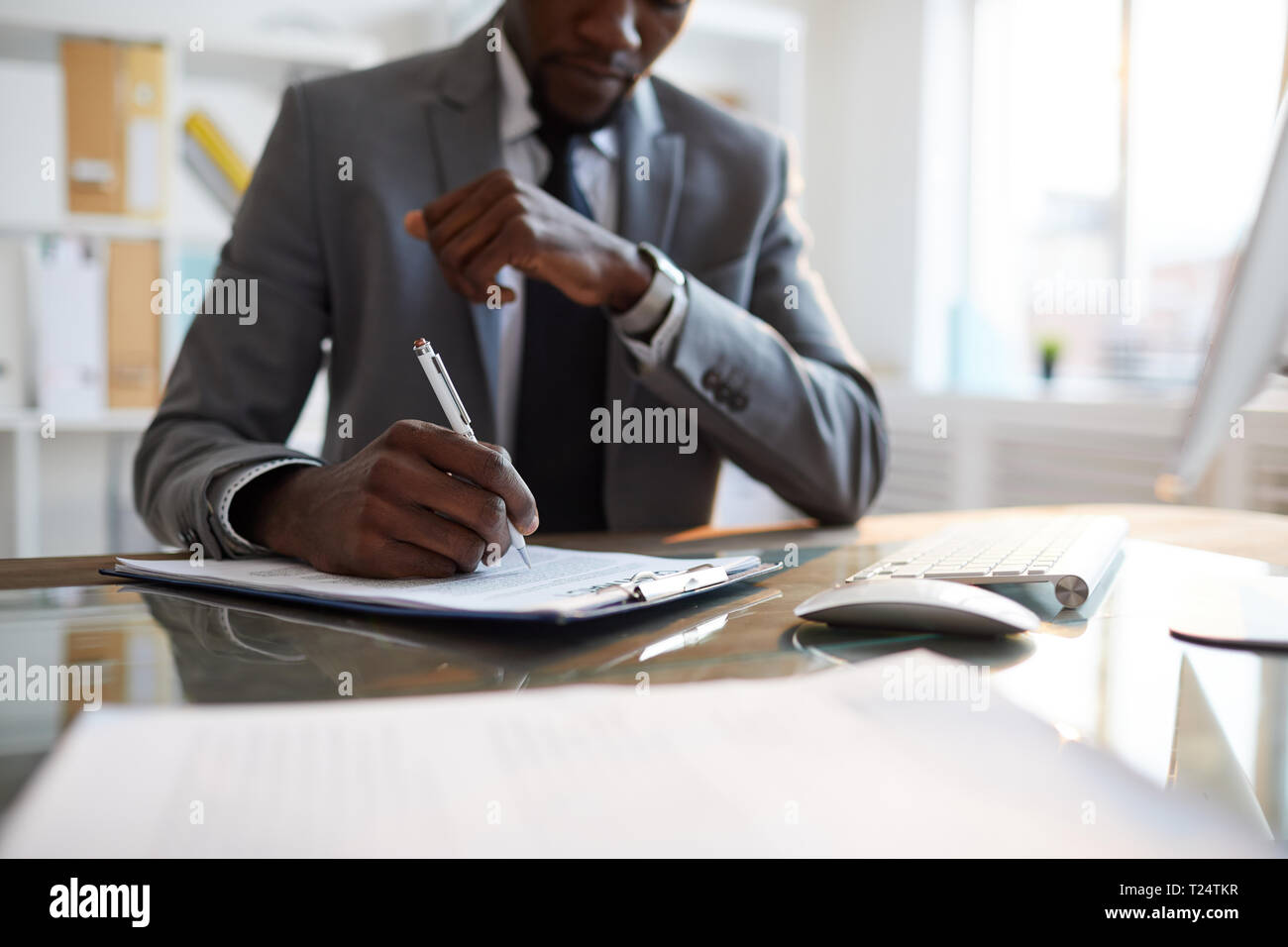 Working with contract Stock Photo - Alamy