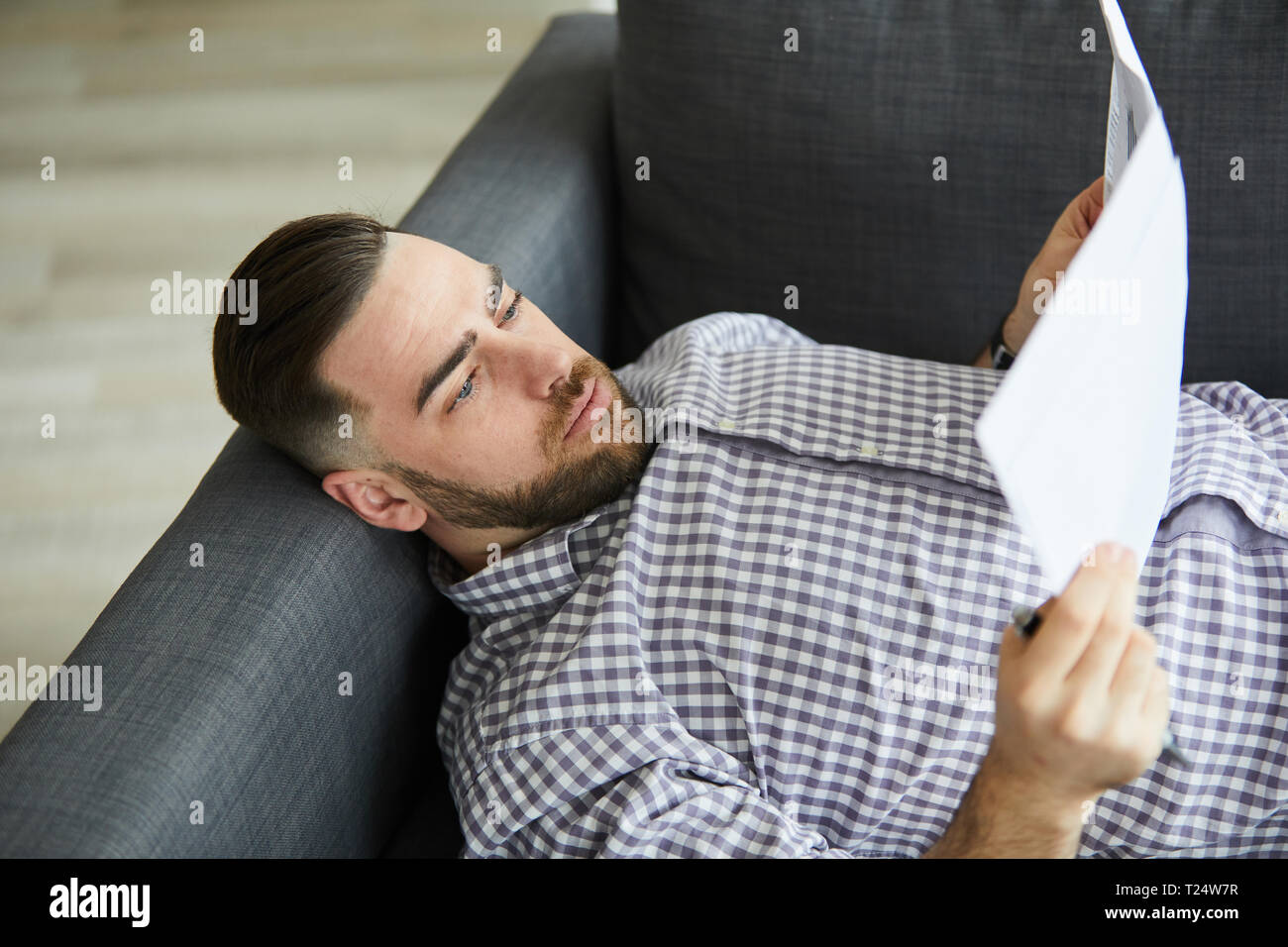 Man with papers Stock Photo - Alamy