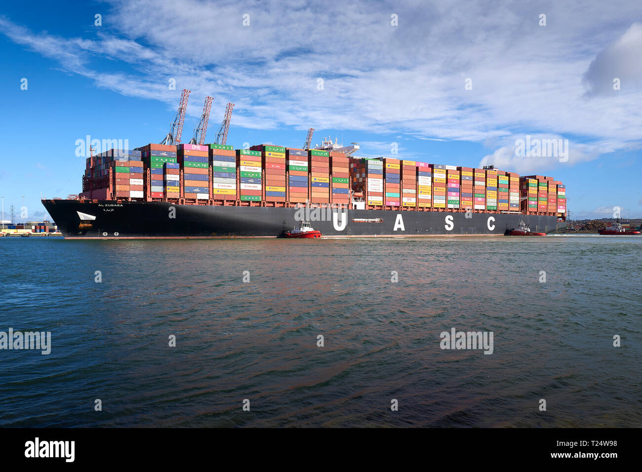 Three Tugs Guide The Ultra Large Container Ship, AL ZUBARA, Into Berth ...