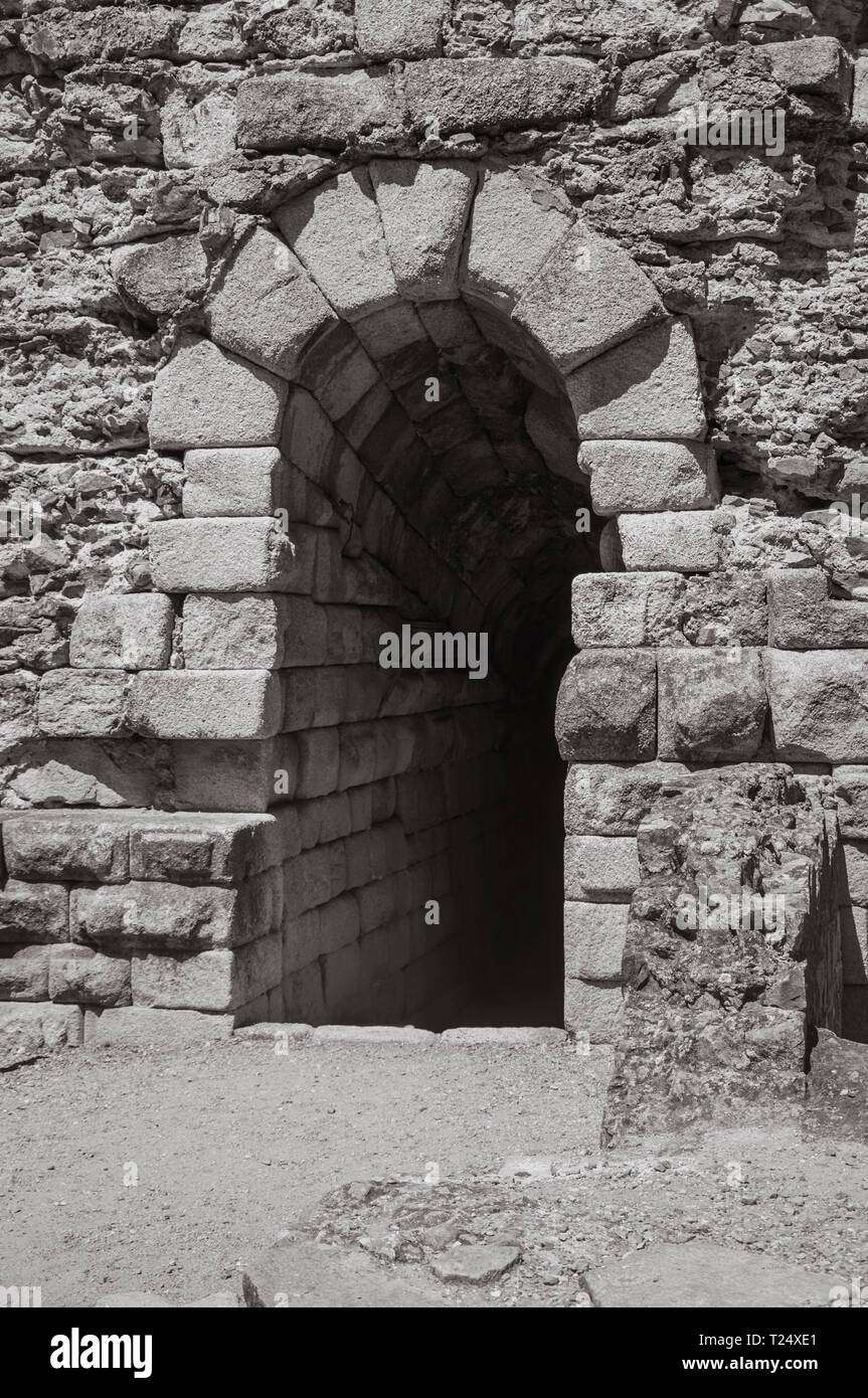 Arched exit on stone wall in the Roman Theater at the archaeological ...