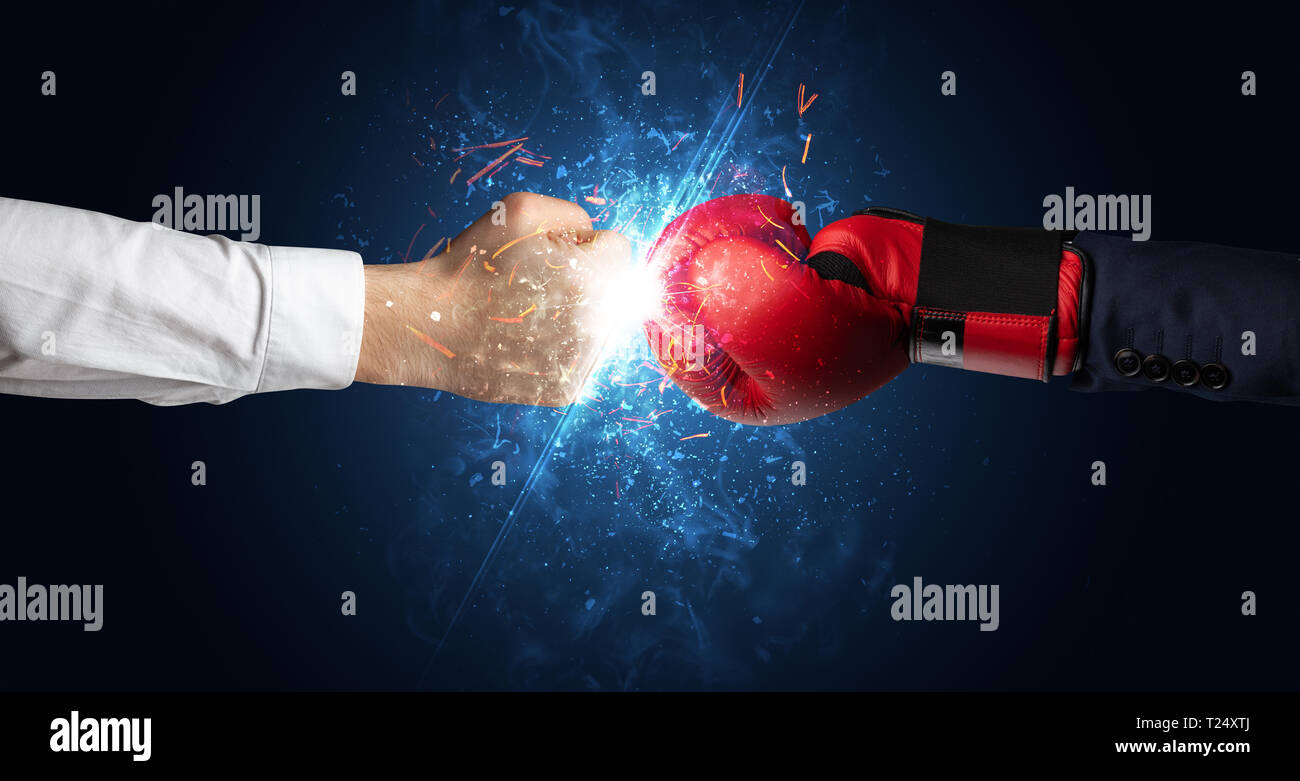 Two hands fighting with light, glow, spark and smoke concept Stock ...