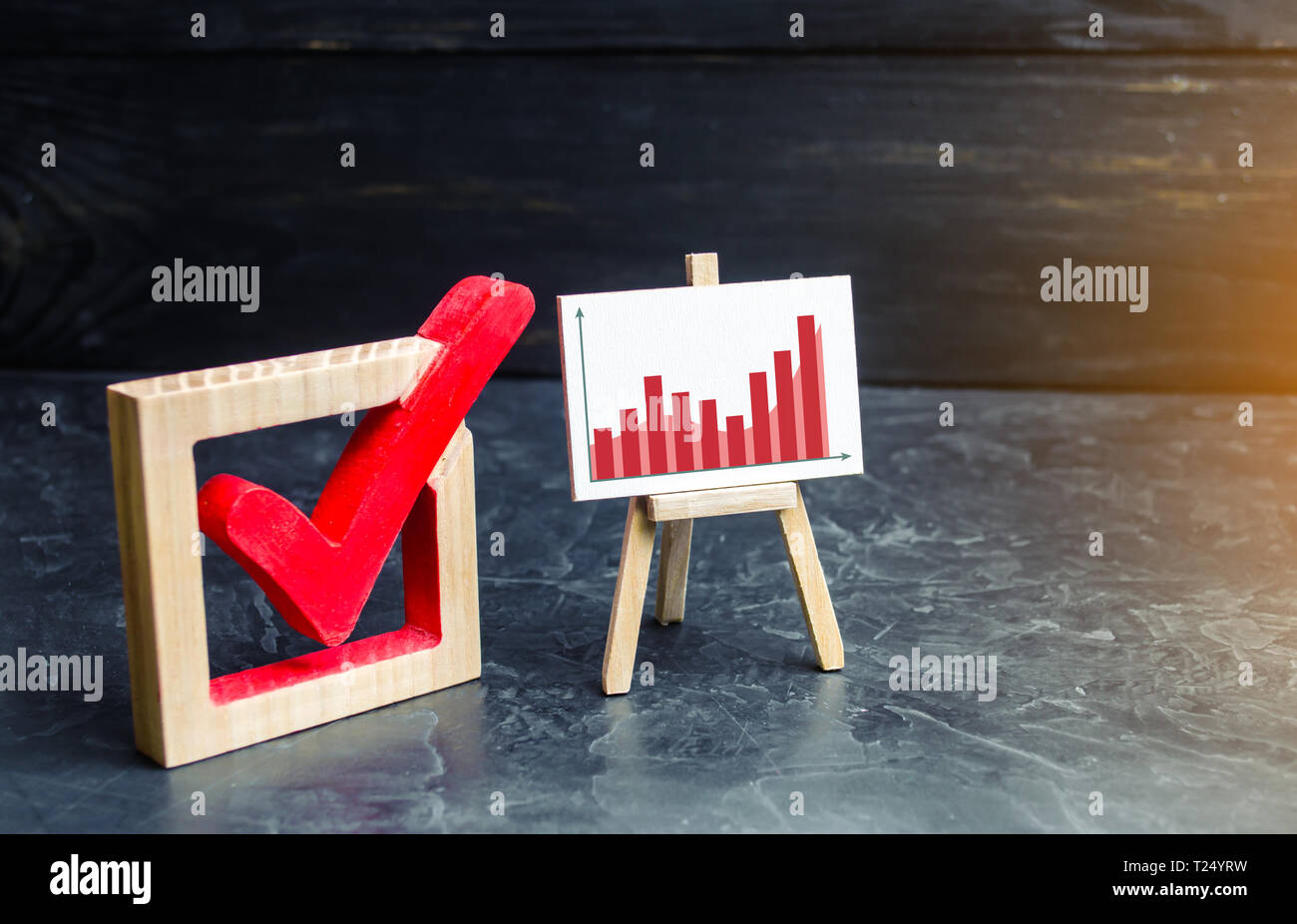 Stand with a red graph and a check mark. Voting, high rating. The ...