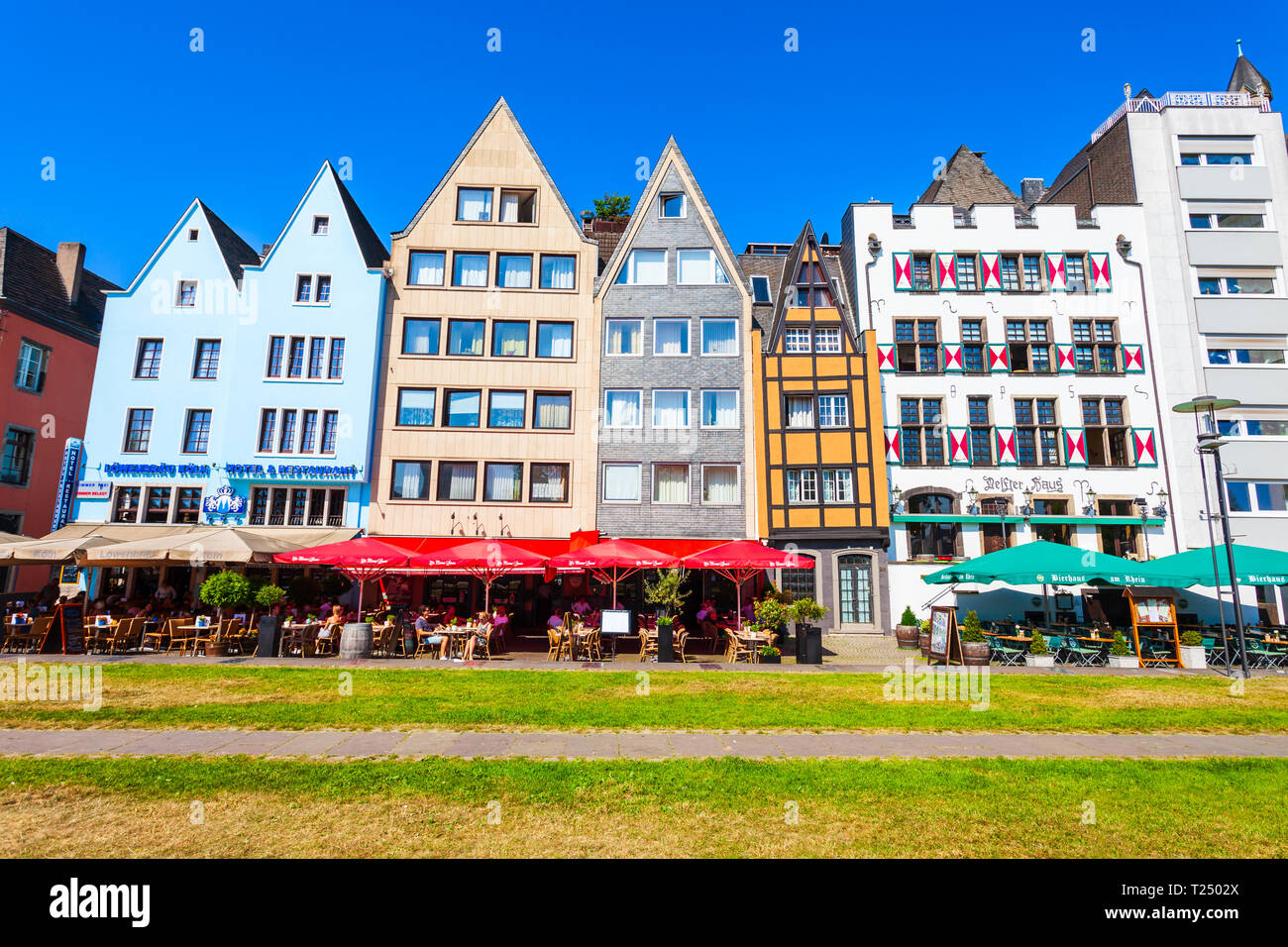 COLOGNE, GERMANY - JUNE 30, 2018: Colorful old houses at the Rhine ...