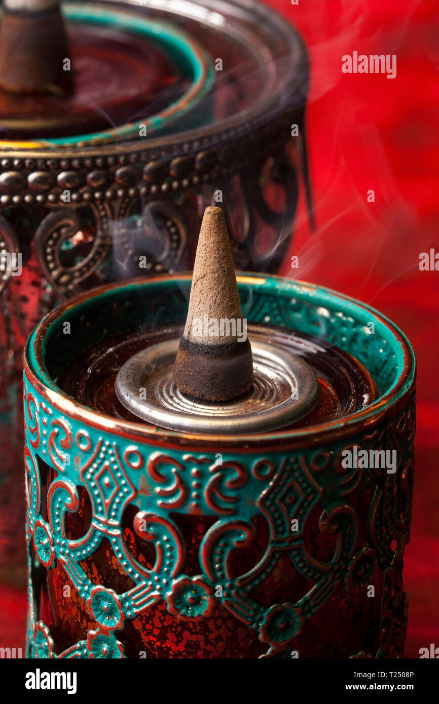 Burning aromatic incense cones Stock Photo - Alamy
