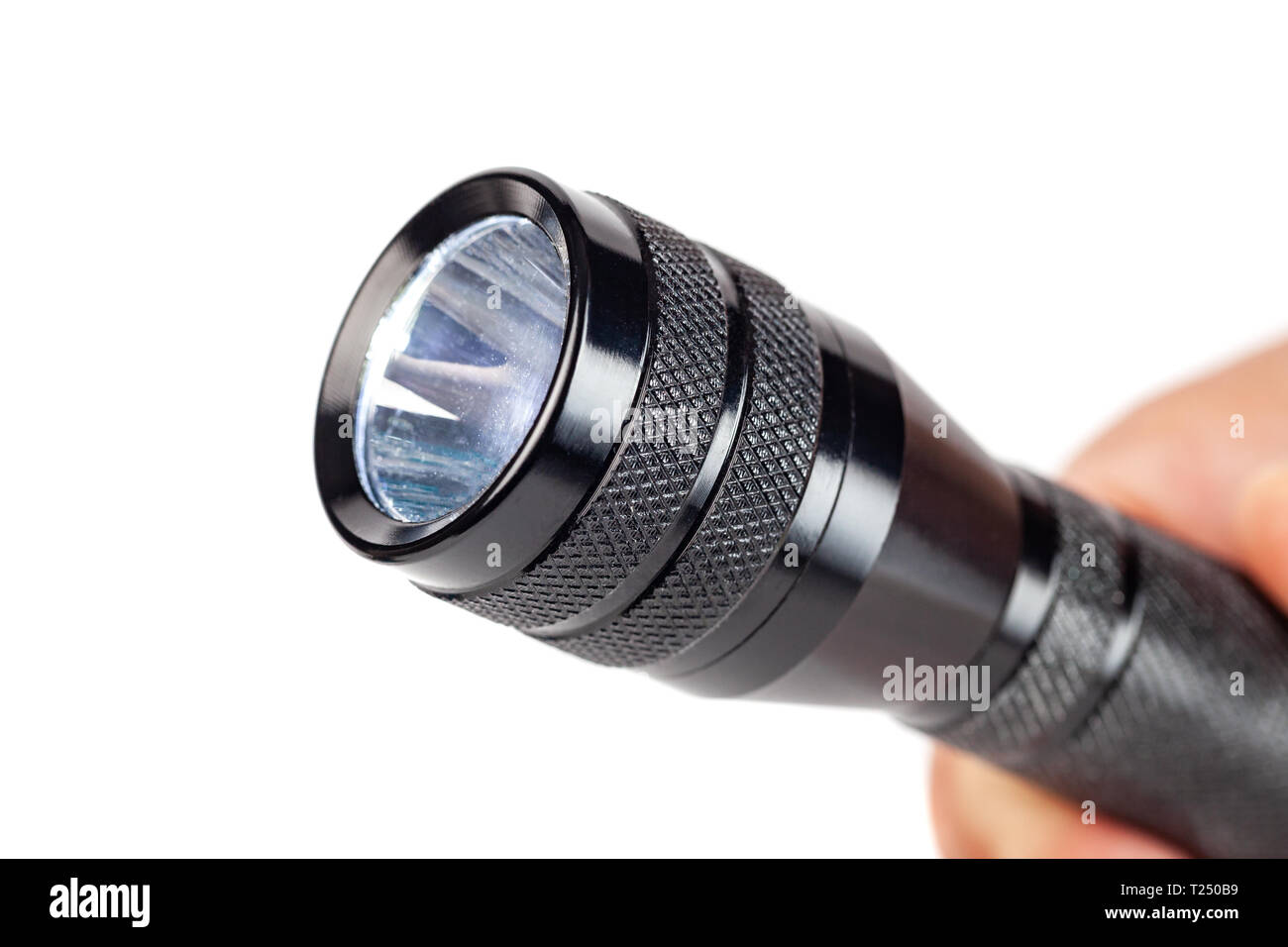 Hand holding flashlight on white background, tools Stock Photo - Alamy