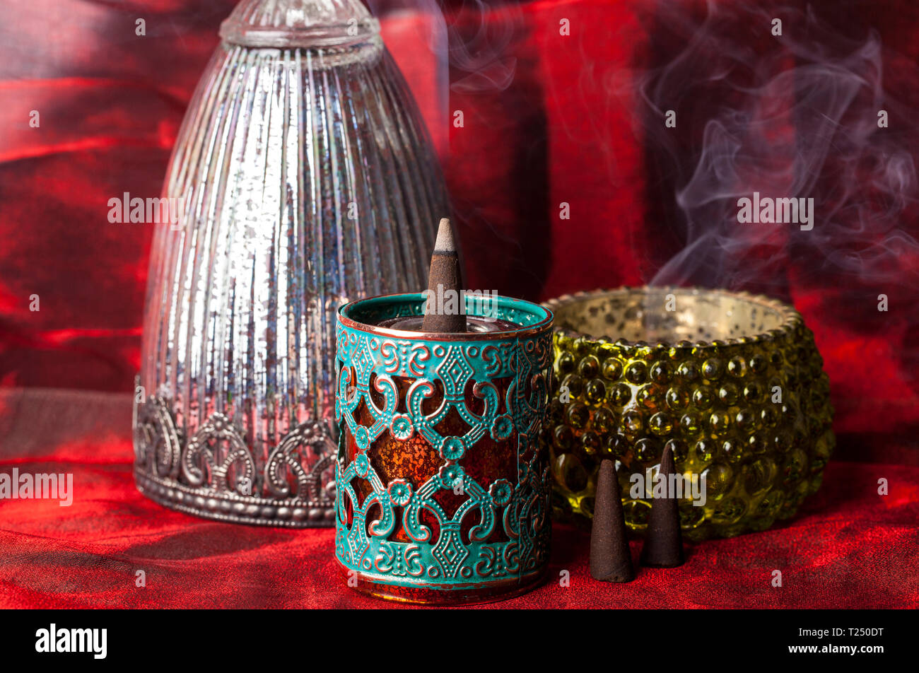 Incense scented smoke cone burning hi-res stock photography and images ...