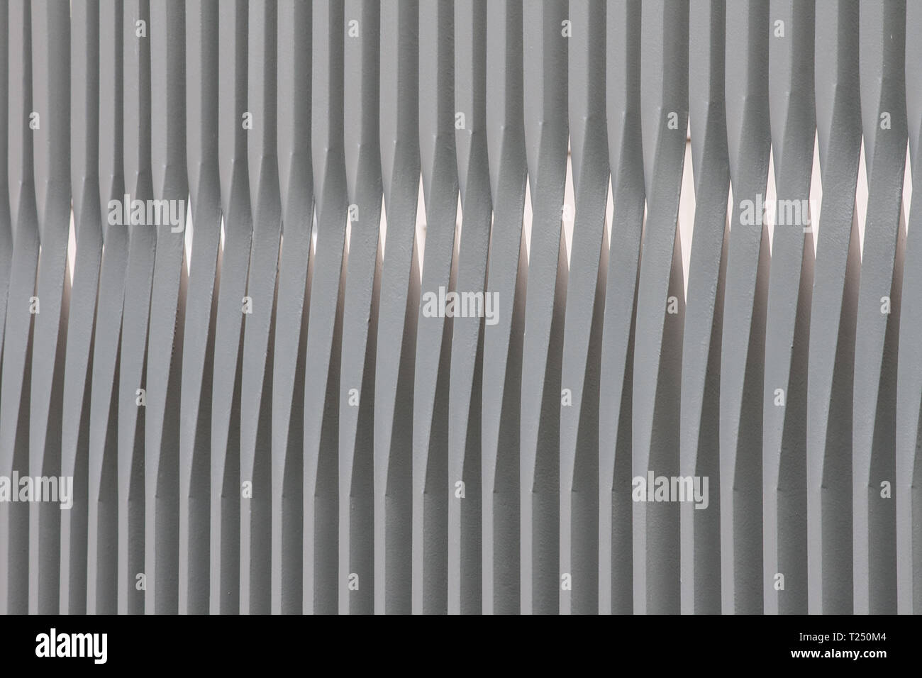 structure in a metal grid, parallel and contorted Stock Photo - Alamy