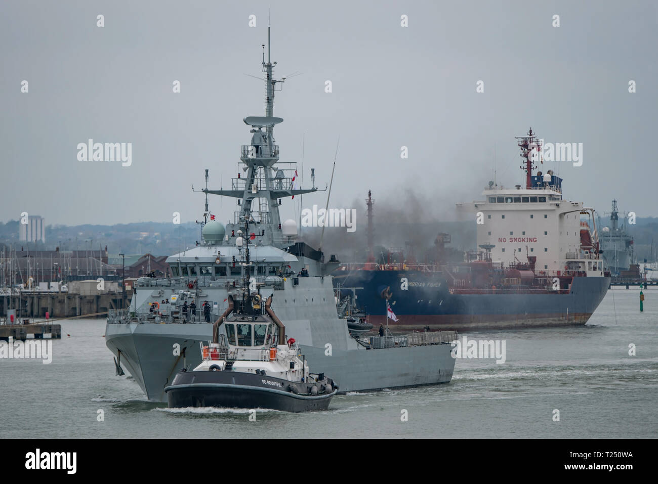The Royal Navy offshore patrol vessel HMS Forth (P222) produces a puff ...
