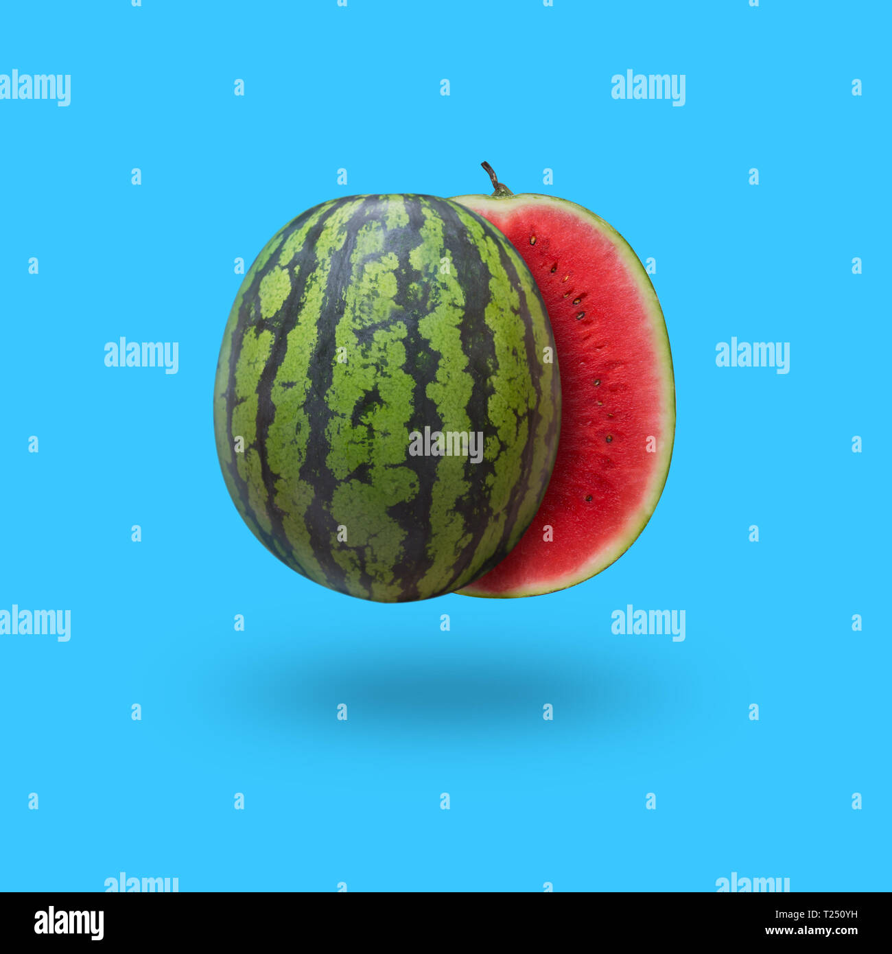 Cutted watermelon isolated on blue background with a shadow Stock Photo ...