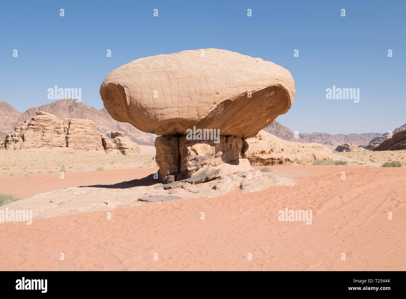 Mushroom shaped rock formation in Wadi Rum desert, a popular safari and ...
