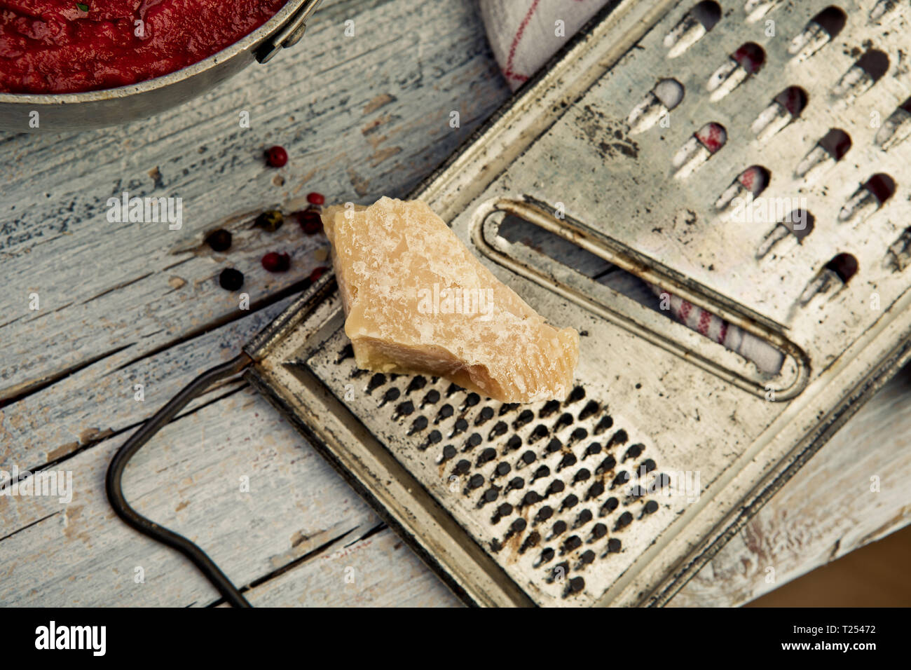 Grating cheese into sauce hi-res stock photography and images - Alamy
