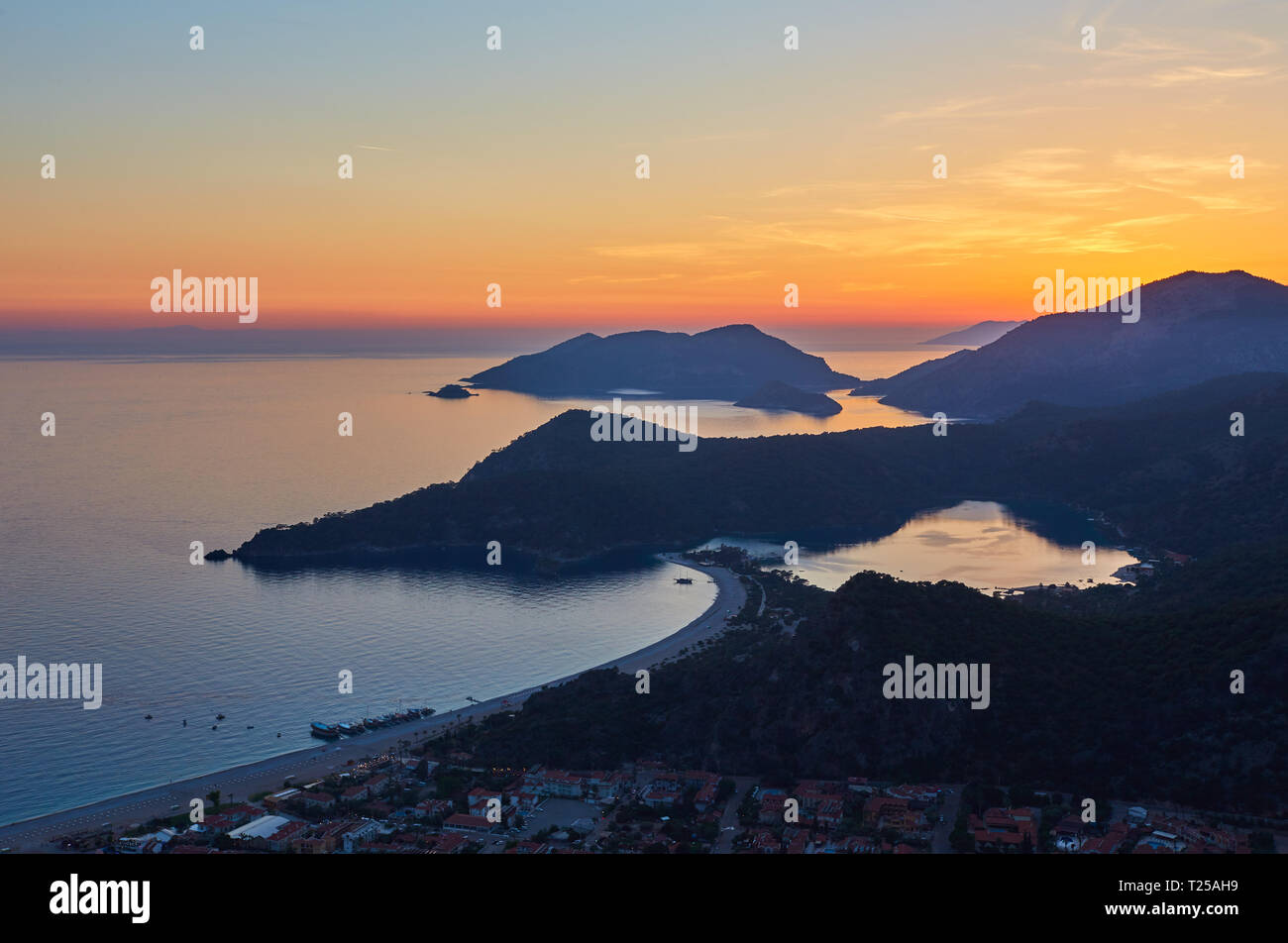 Oludeniz beach and small town of Oludeniz, view from mountain at sunset ... Oludeniz beach and small town of Oludeniz, view from mountain at sunset ...