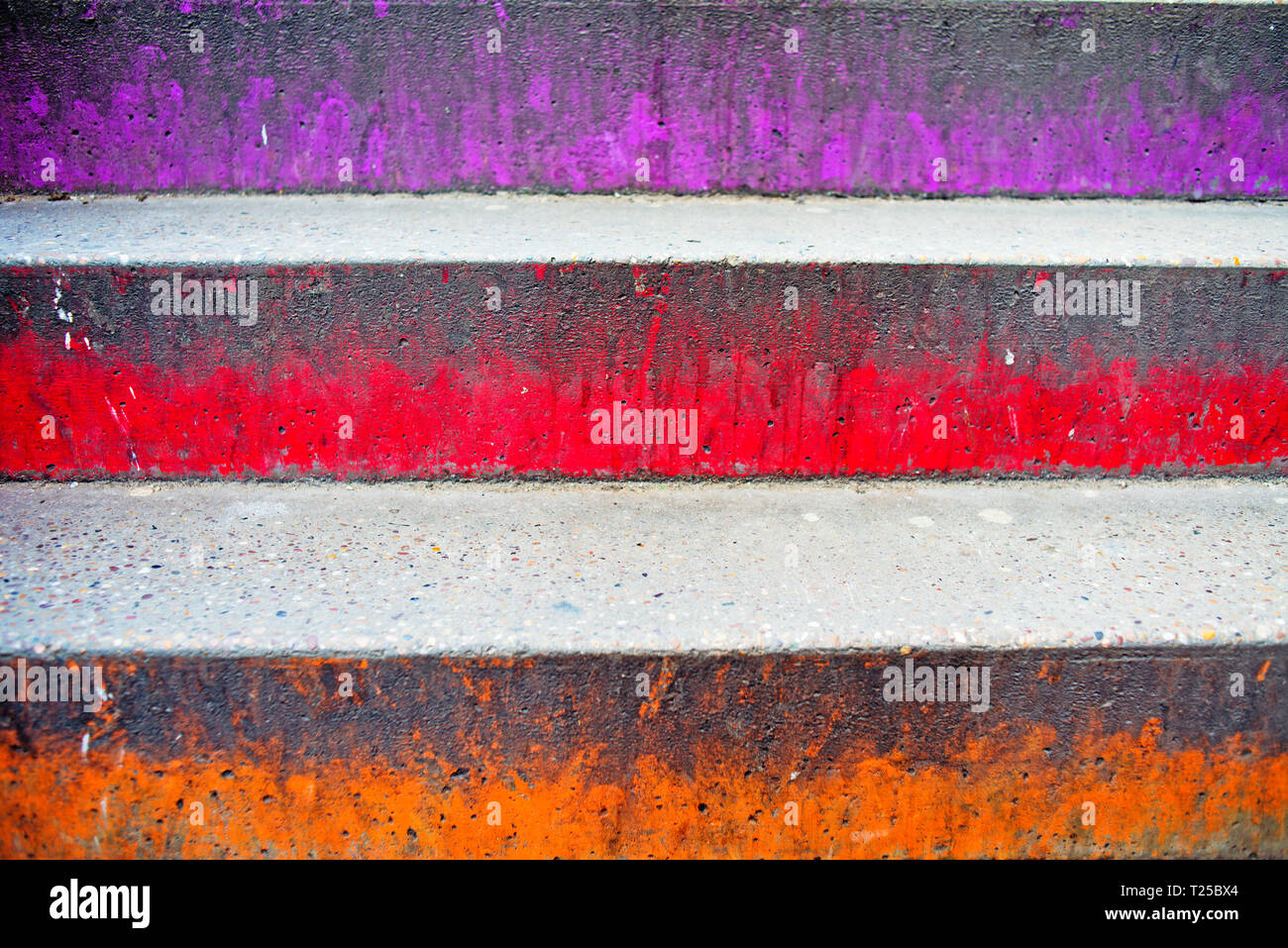 Purple Orange and Red painted steps Stock Photo - Alamy