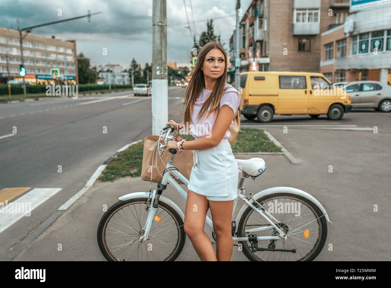 Beautiful girls on a cycle hi-res stock photography and images - Alamy