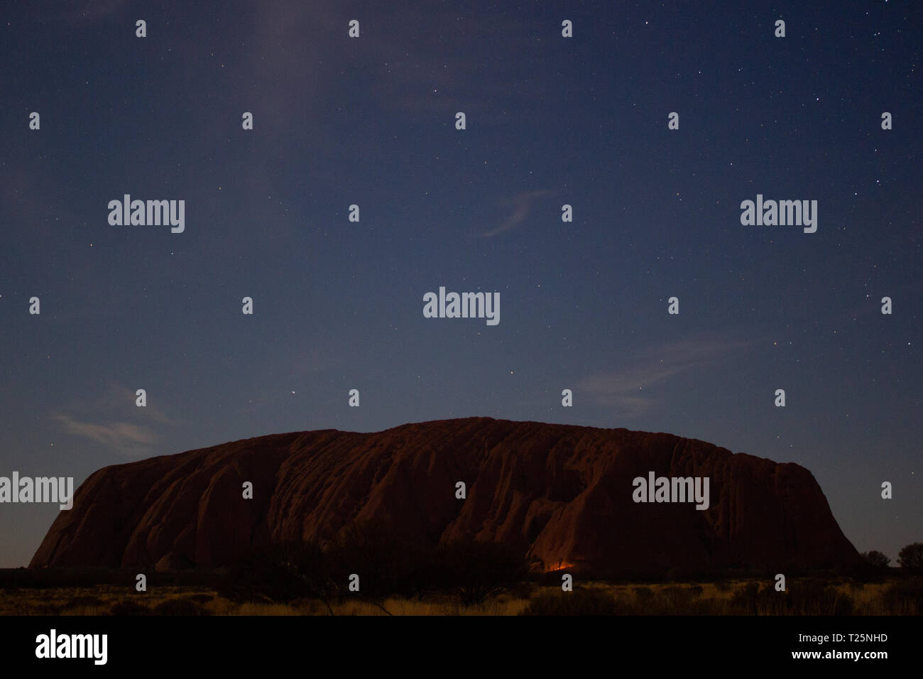 Uluru at night with car in front, ayers Rock, the Red Center of ...