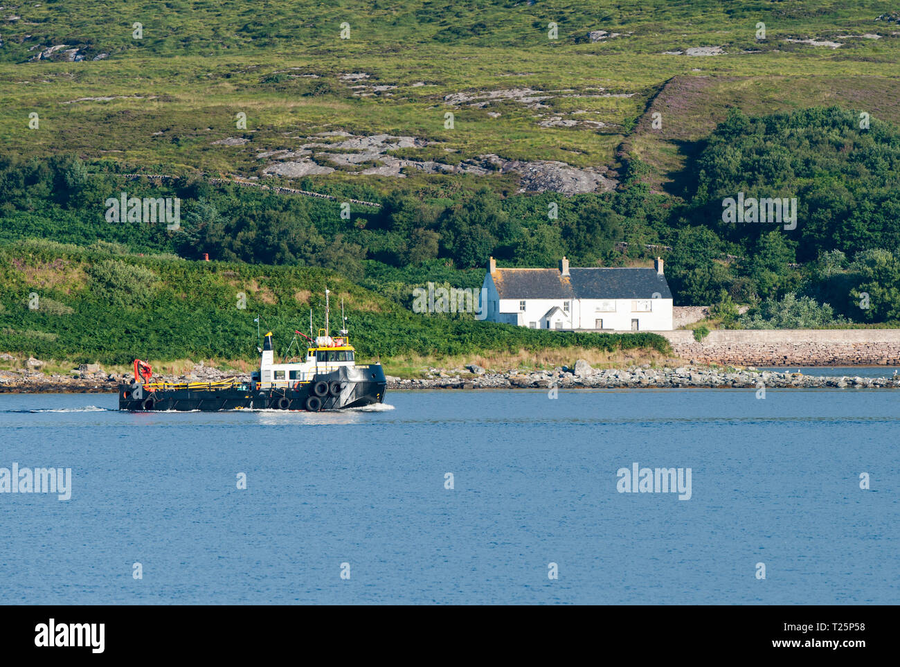 The Venture Fish Farm Boat, Sailing Past White Cottages at Isle Martin ...