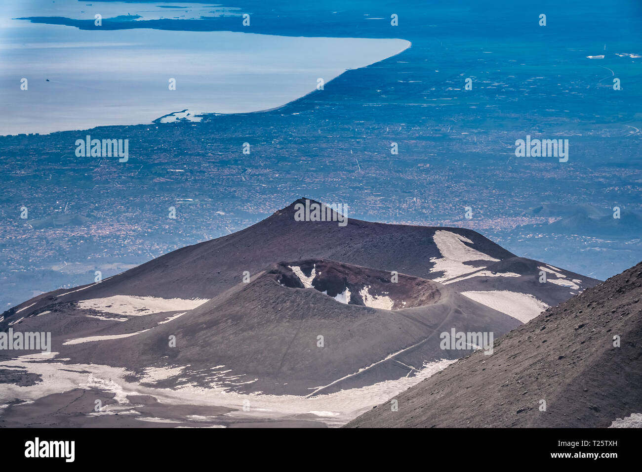 View from the top of Mount Etna with the city of Catania in the ...