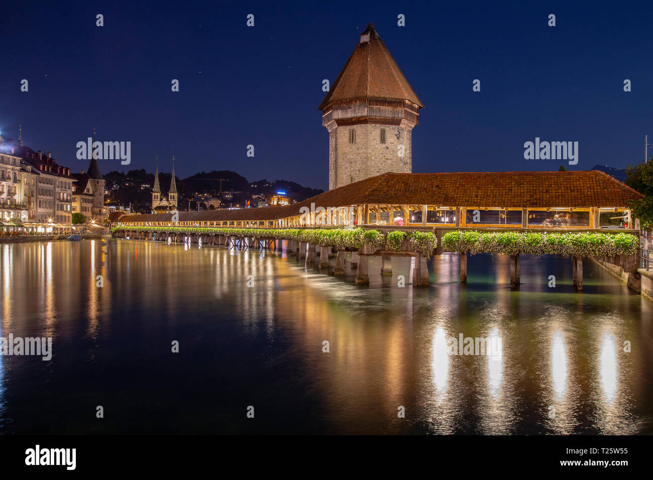 Beautiful medieval wooden bridge that crosses the lake of Lucerne, is ...