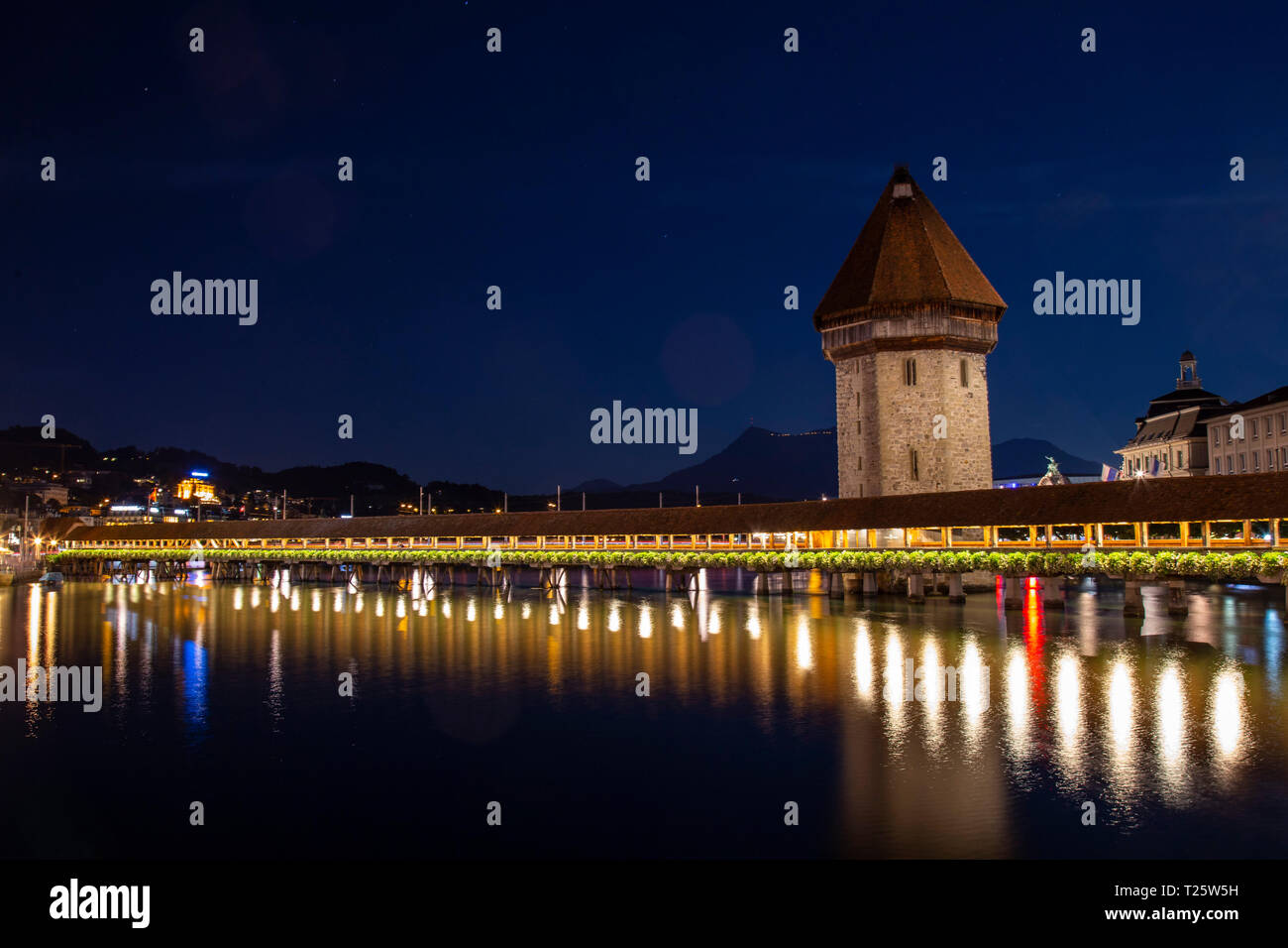Beautiful medieval wooden bridge that crosses the lake of Lucerne, is ...