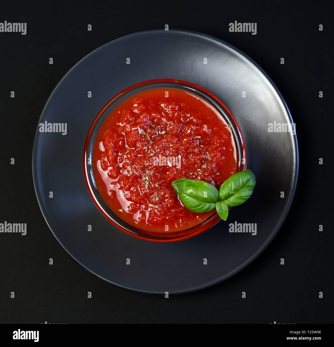 Concept of Italian food. Top view of Italian tomato sauce with basil ...