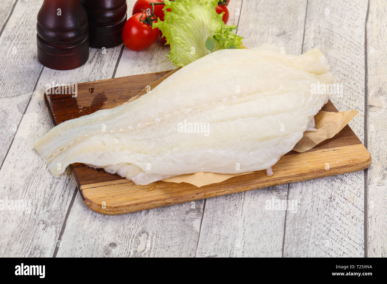 Raw halibut fillet ready for cooking Stock Photo - Alamy