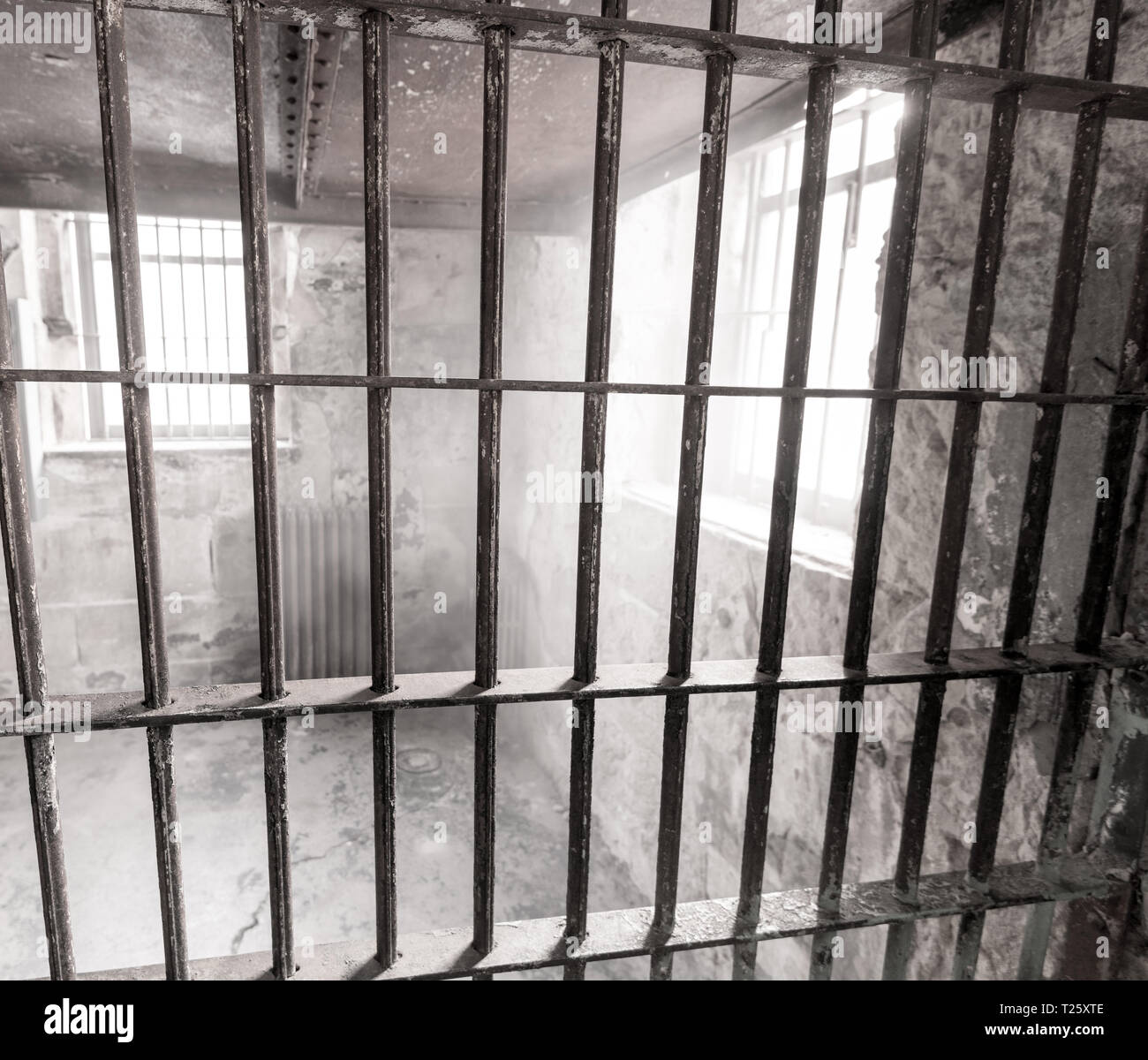 Smoke inside of a jail cell light by a near window Stock Photo - Alamy