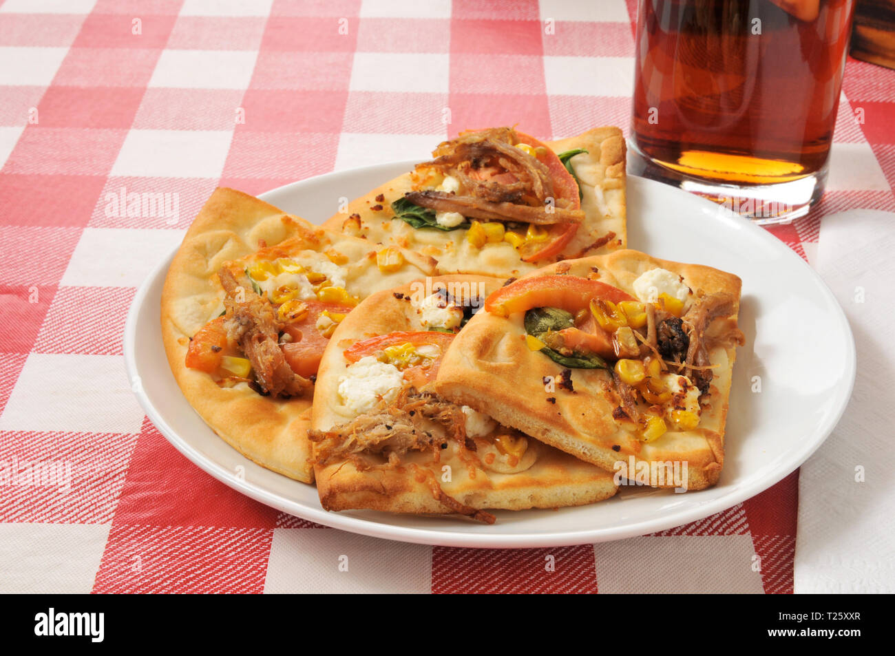Gourmet flatbread appetizers with a soft drink Stock Photo - Alamy