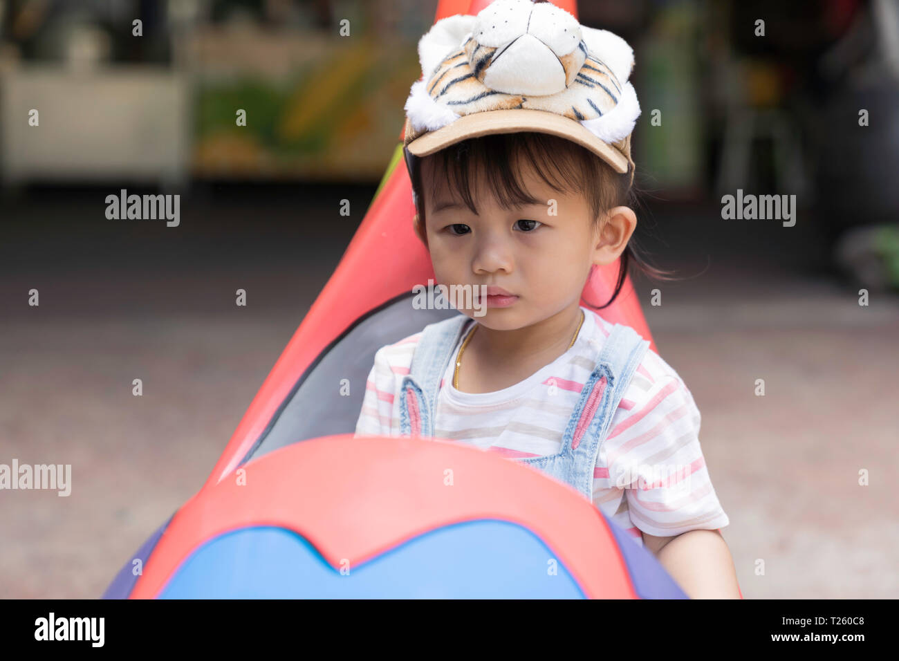 Asian kid girl is happiness in car toy, family travel concept Stock ...