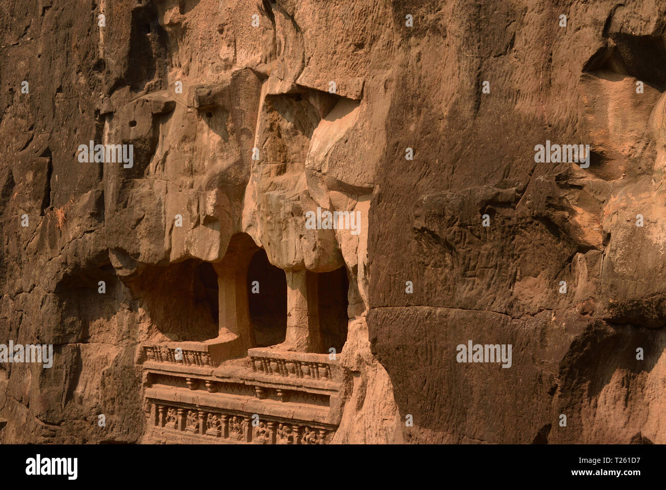 The ancient rock cut out balcony at Ellora Caves, India Stock Photo - Alamy