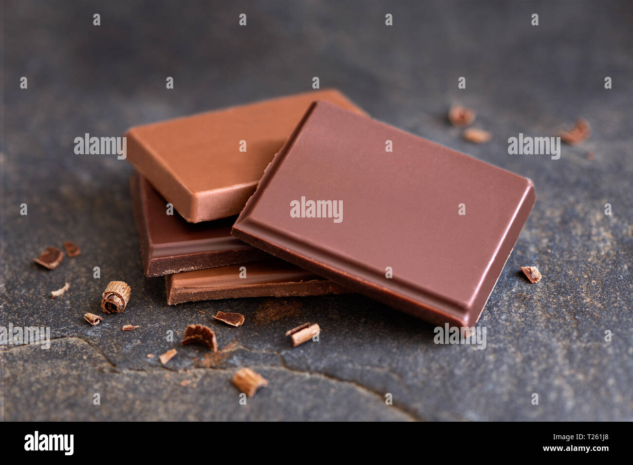 Four squares of dark chocolate hi-res stock photography and images - Alamy