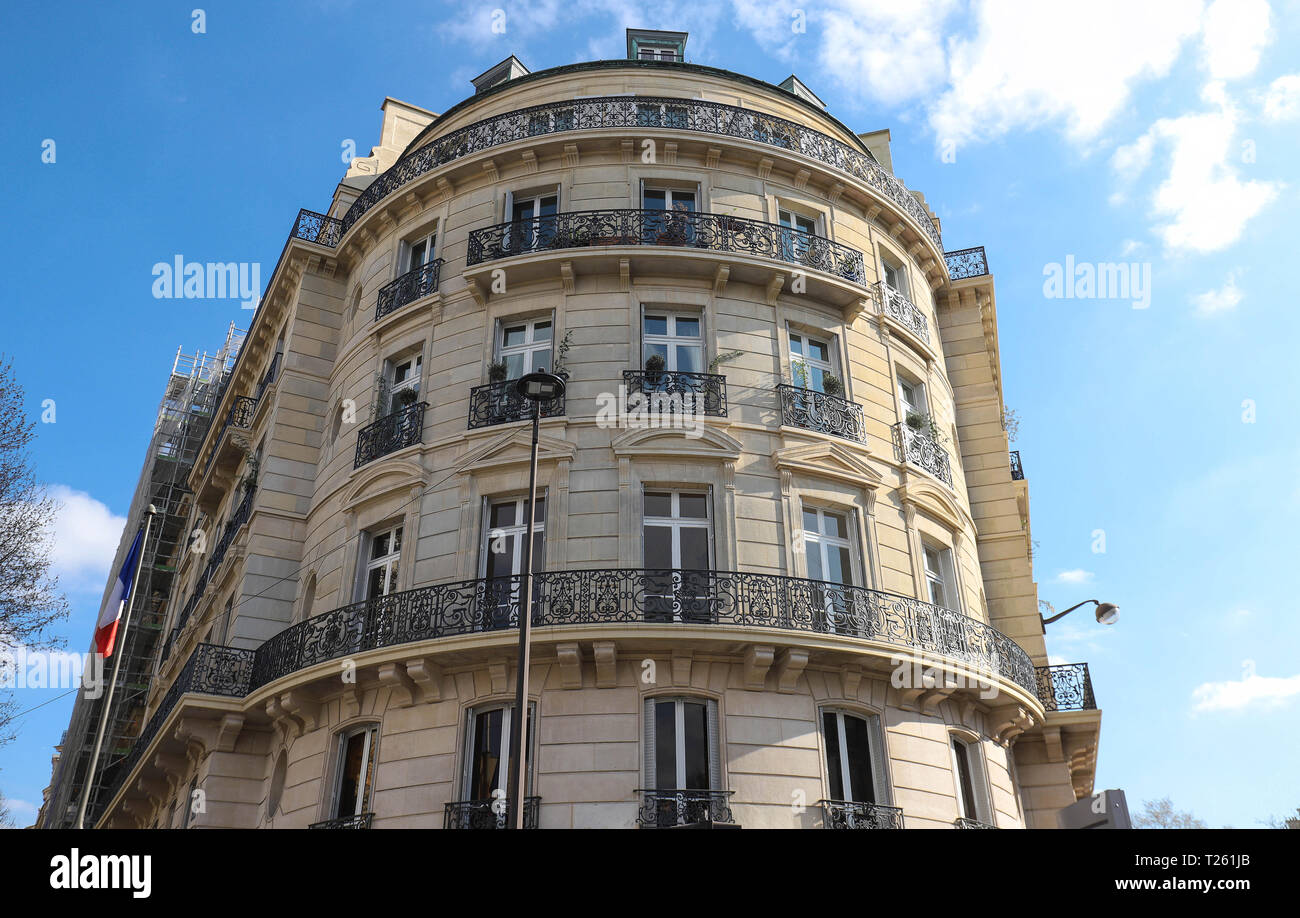 Traditional French house with typical balconies and windows. Paris ...