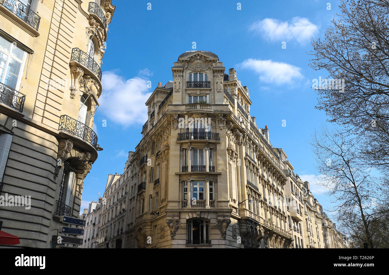 Traditional French house with typical balconies and windows. Paris ...