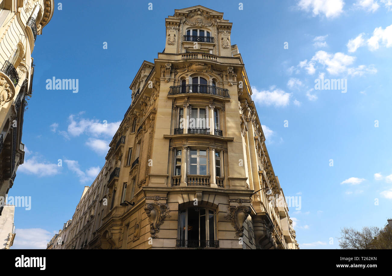 Traditional French house with typical balconies and windows. Paris ...