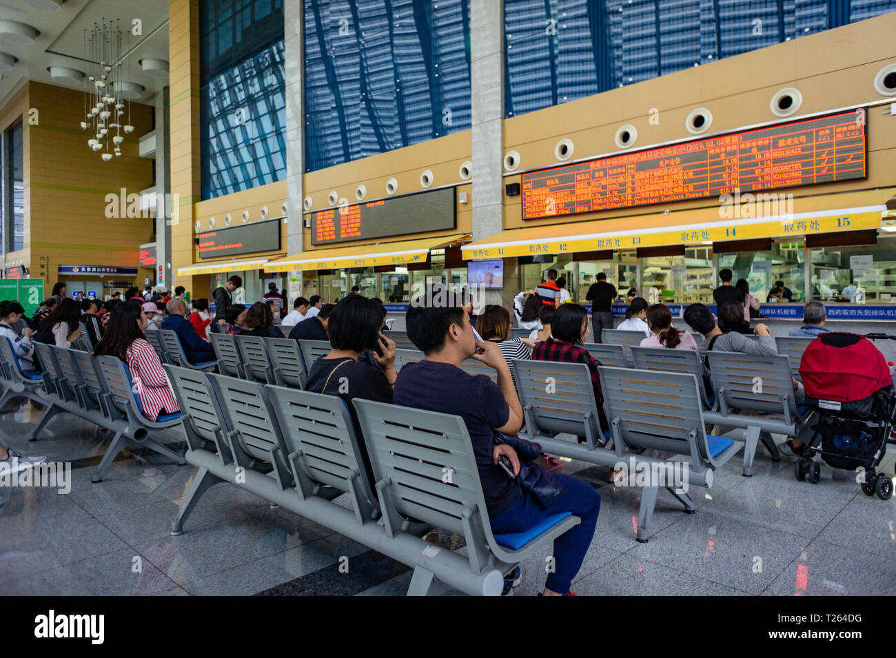 Patients waiting to collect medicine hi-res stock photography and ...