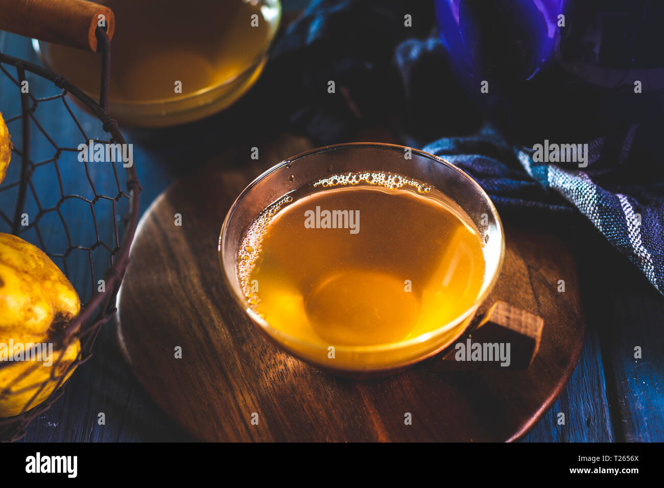 Tea cup of homemade hot quince infusion Stock Photo - Alamy