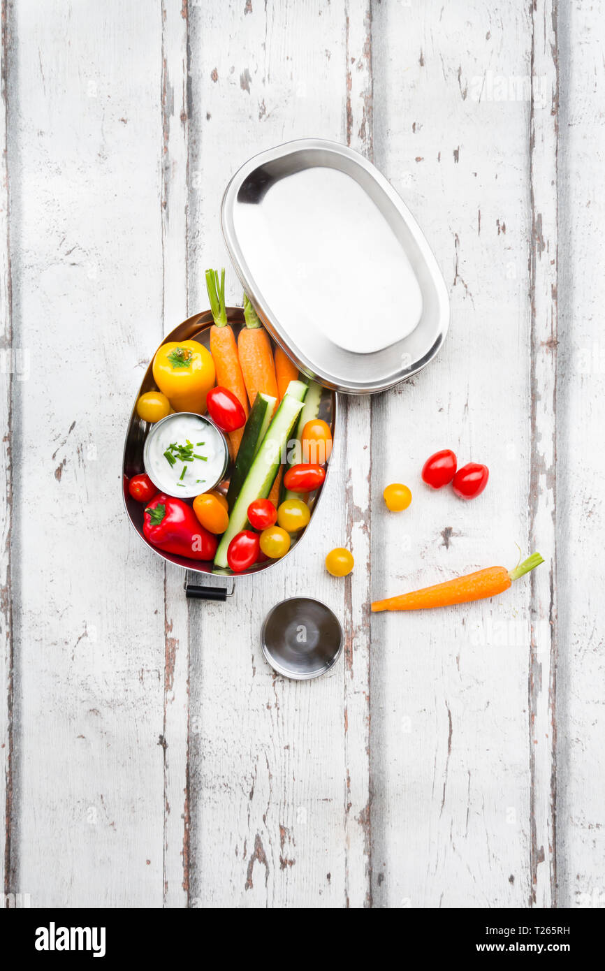 Lunch box with carrot, paprika, cucumber, tomato and chive dip Stock ...