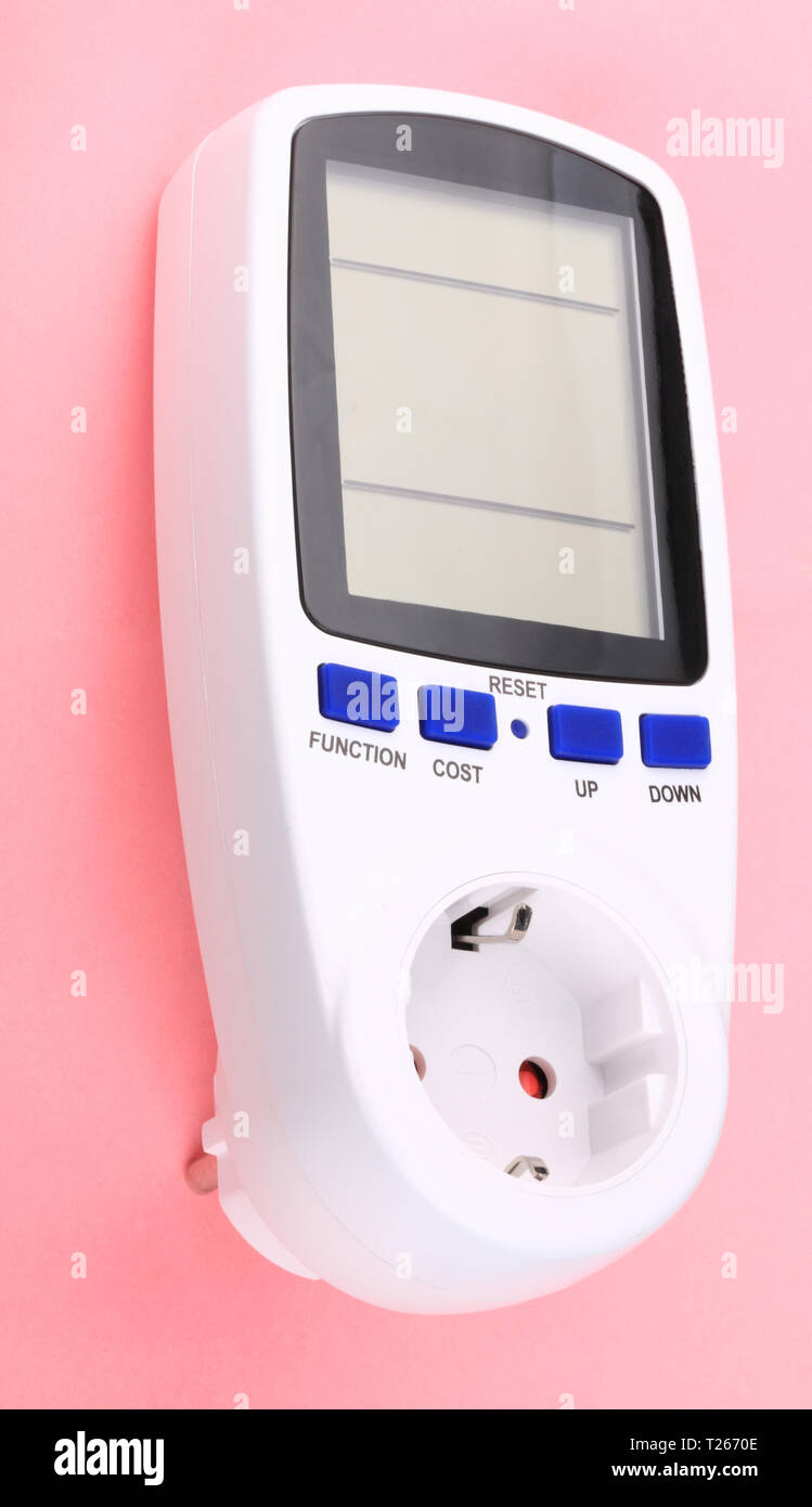 Digital Power Meter on pink background Stock Photo - Alamy