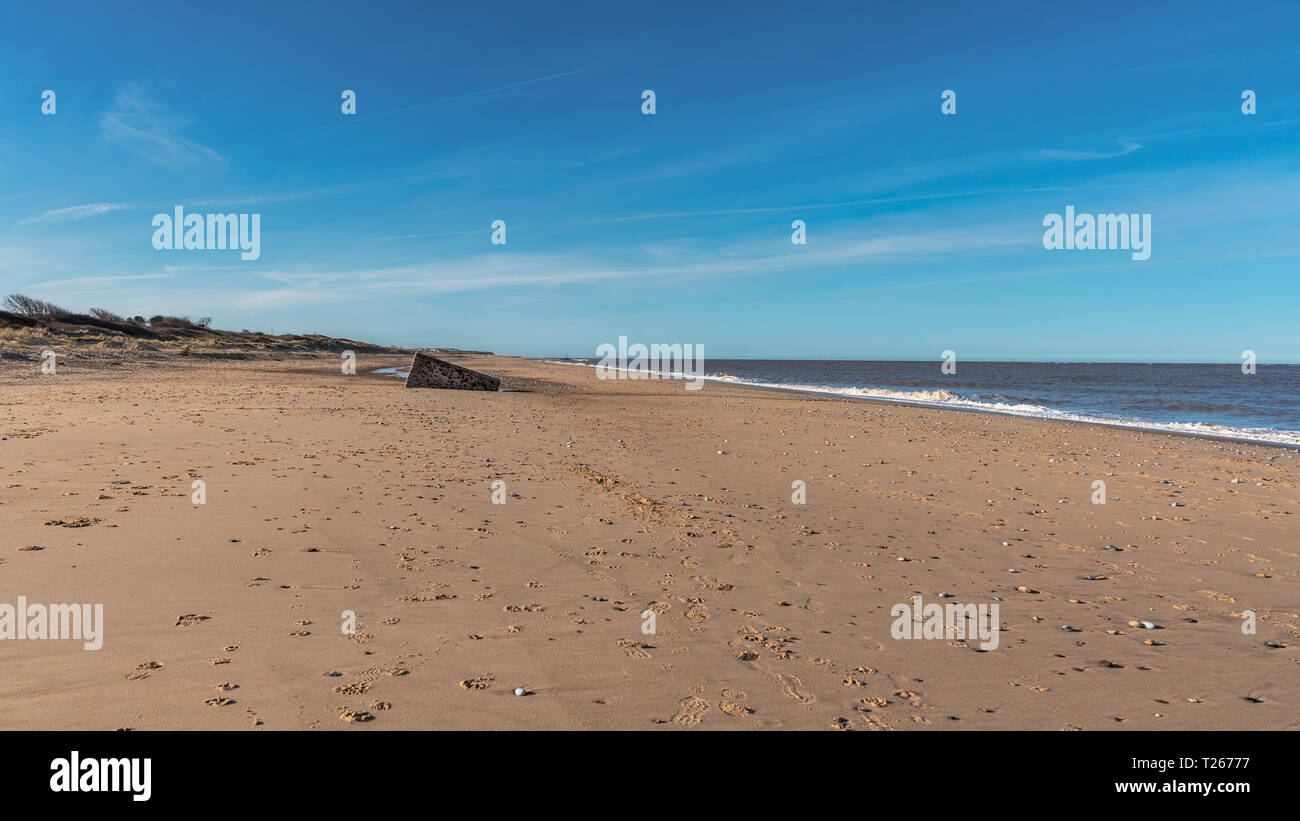 North sea coast in Caister-on-Sea, Norfolk, England, UK - with an old ...