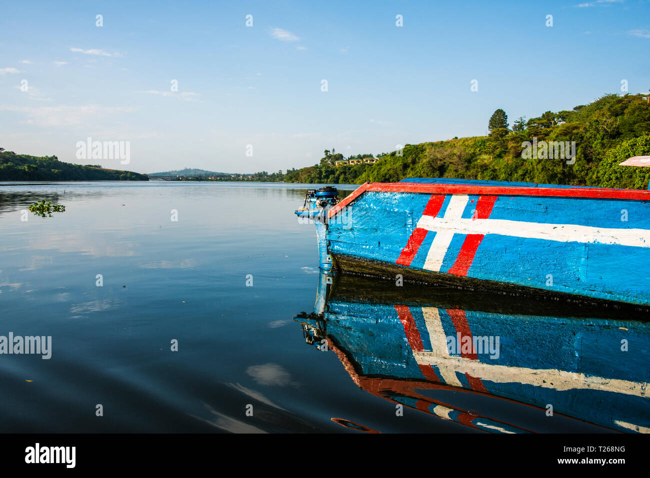 Africa, Uganda, Jinja, Colourful boat at the source of the Nile Stock ...