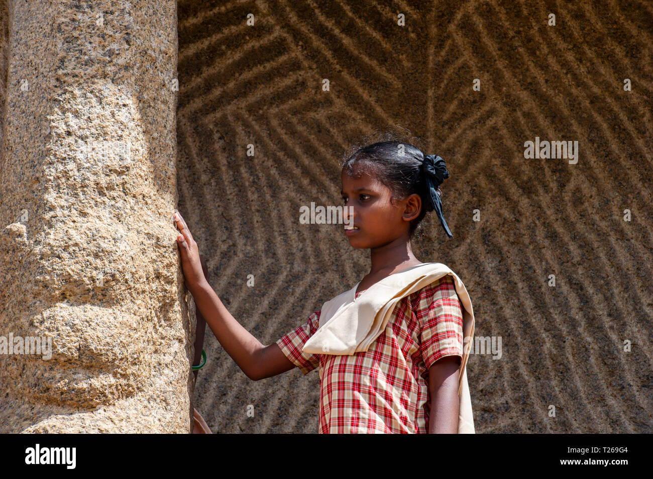 A very beautiful Indian gild poses for the camera at the Monuments at ...