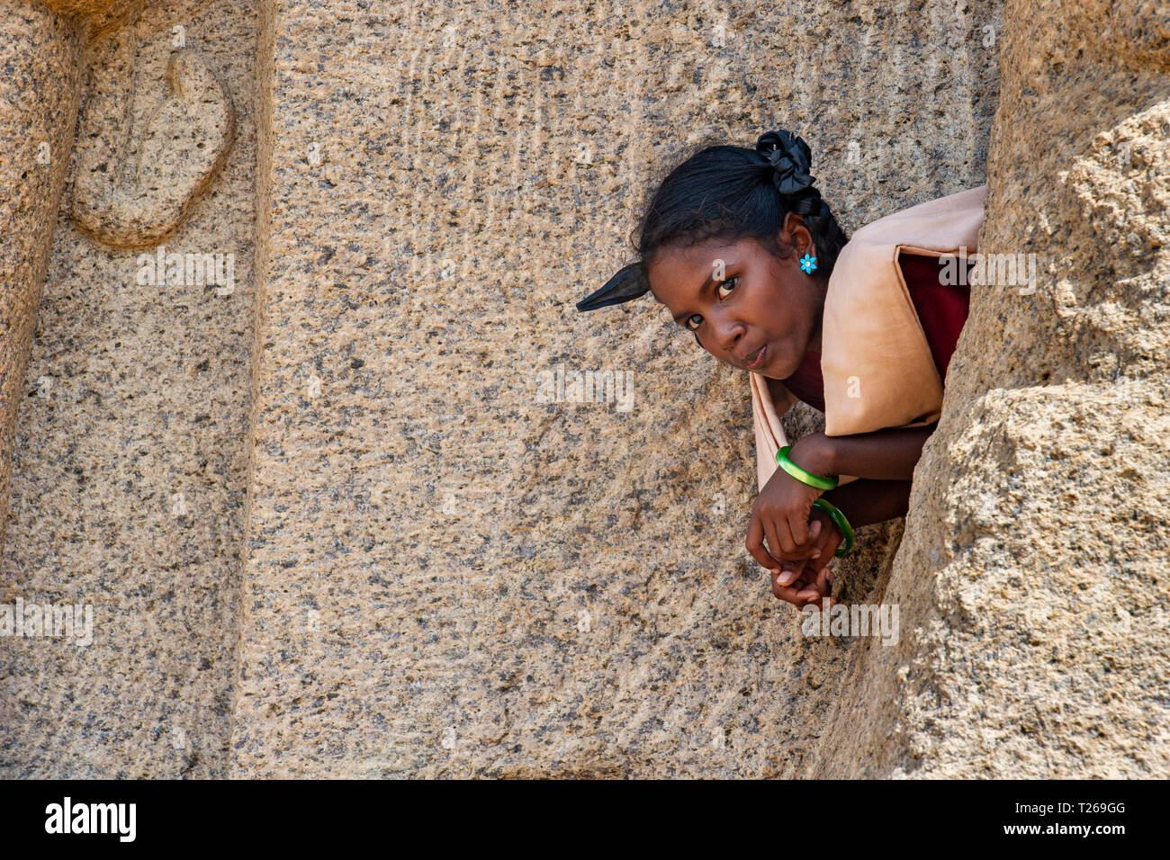 A very beautiful Indian gild poses for the camera at the Monuments at ...