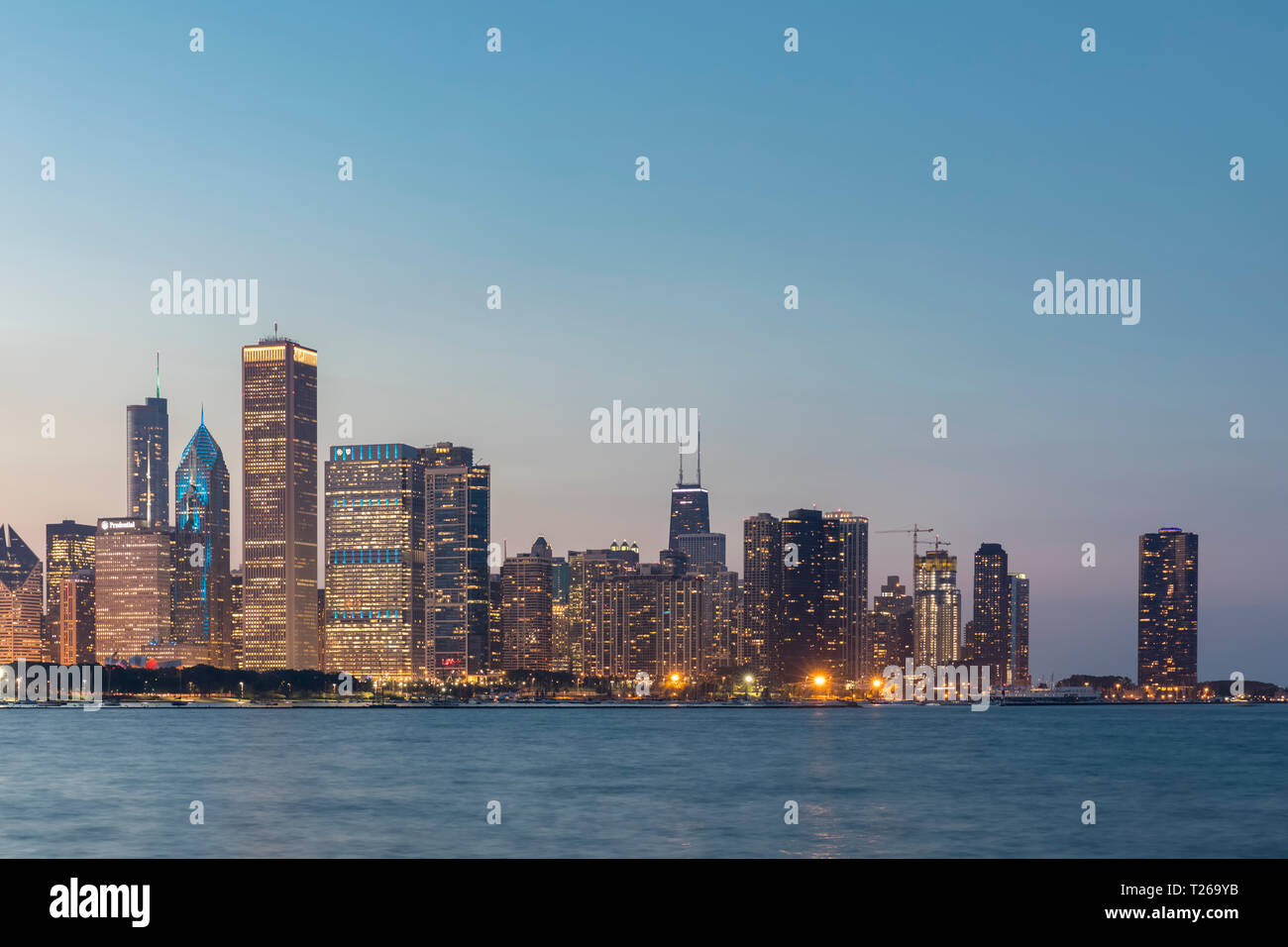 USA, Illinois, Chicago, Lake Michigan, cityscape at blue hour Stock ...