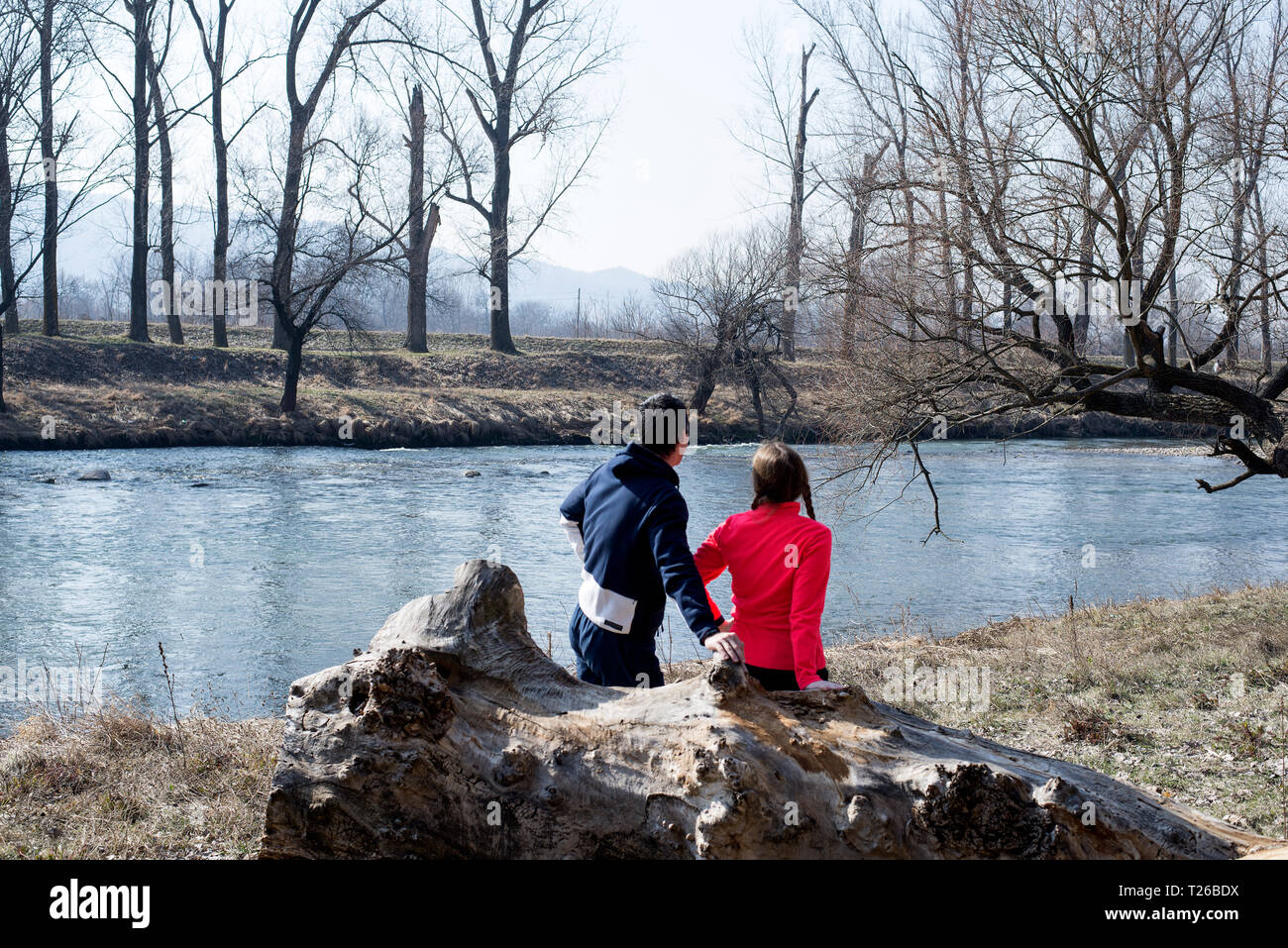 Man and woman by the river Stock Photo - Alamy