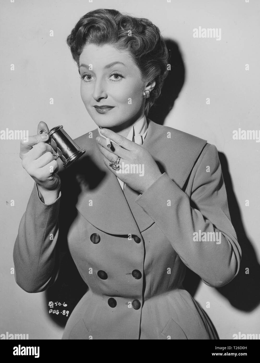 Young Wives Tale (1951) Helen Cherry smoking, Date: 1951 Stock Photo ...
