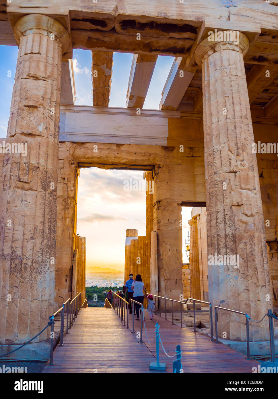 Columns of Propylaea entrance gateway of Acropolis, Athens, Greece overlooking the sunset and ...