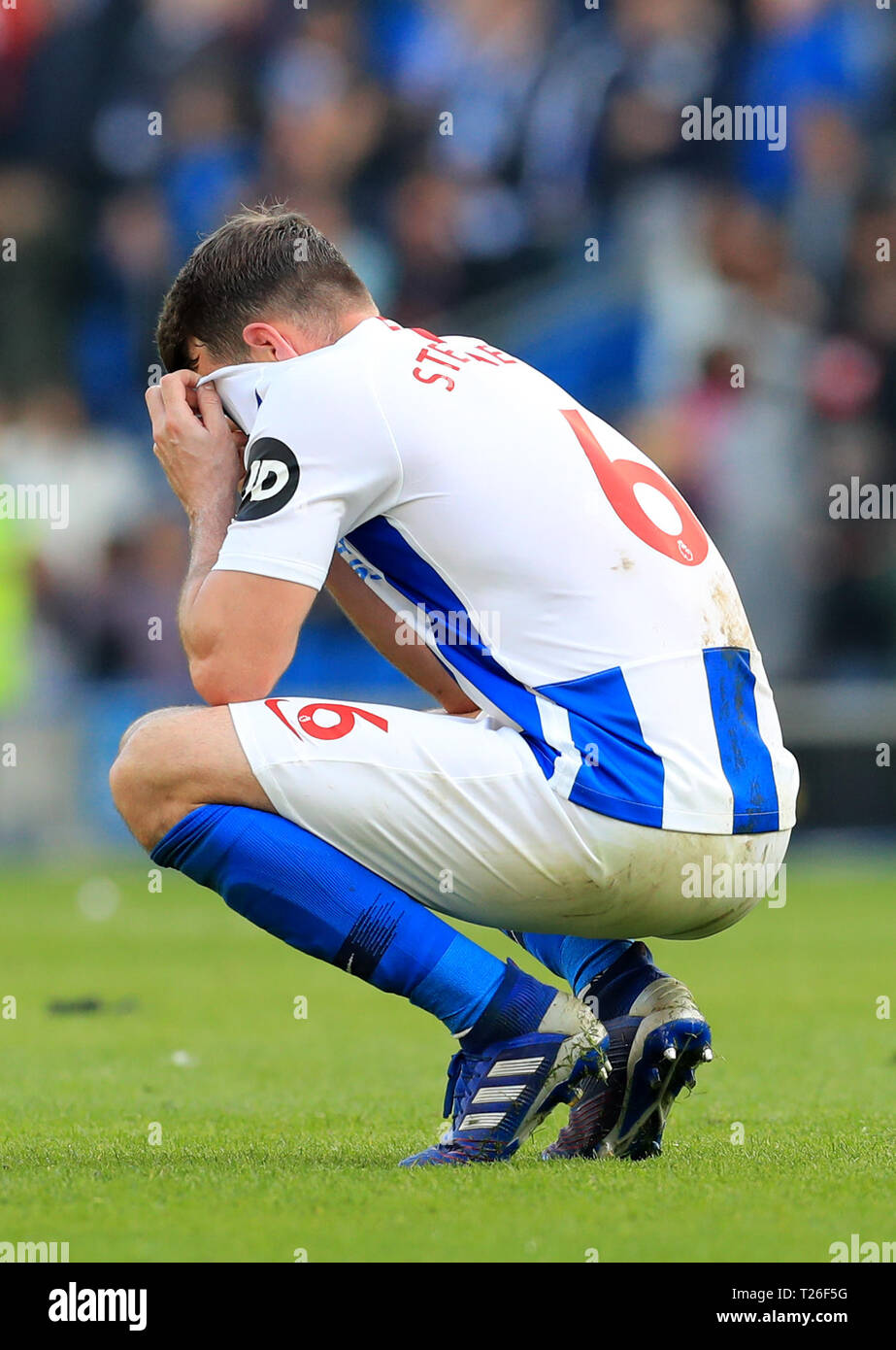 Brighton & Hove Albion's Dale Stephens reacts after the final whistle ...