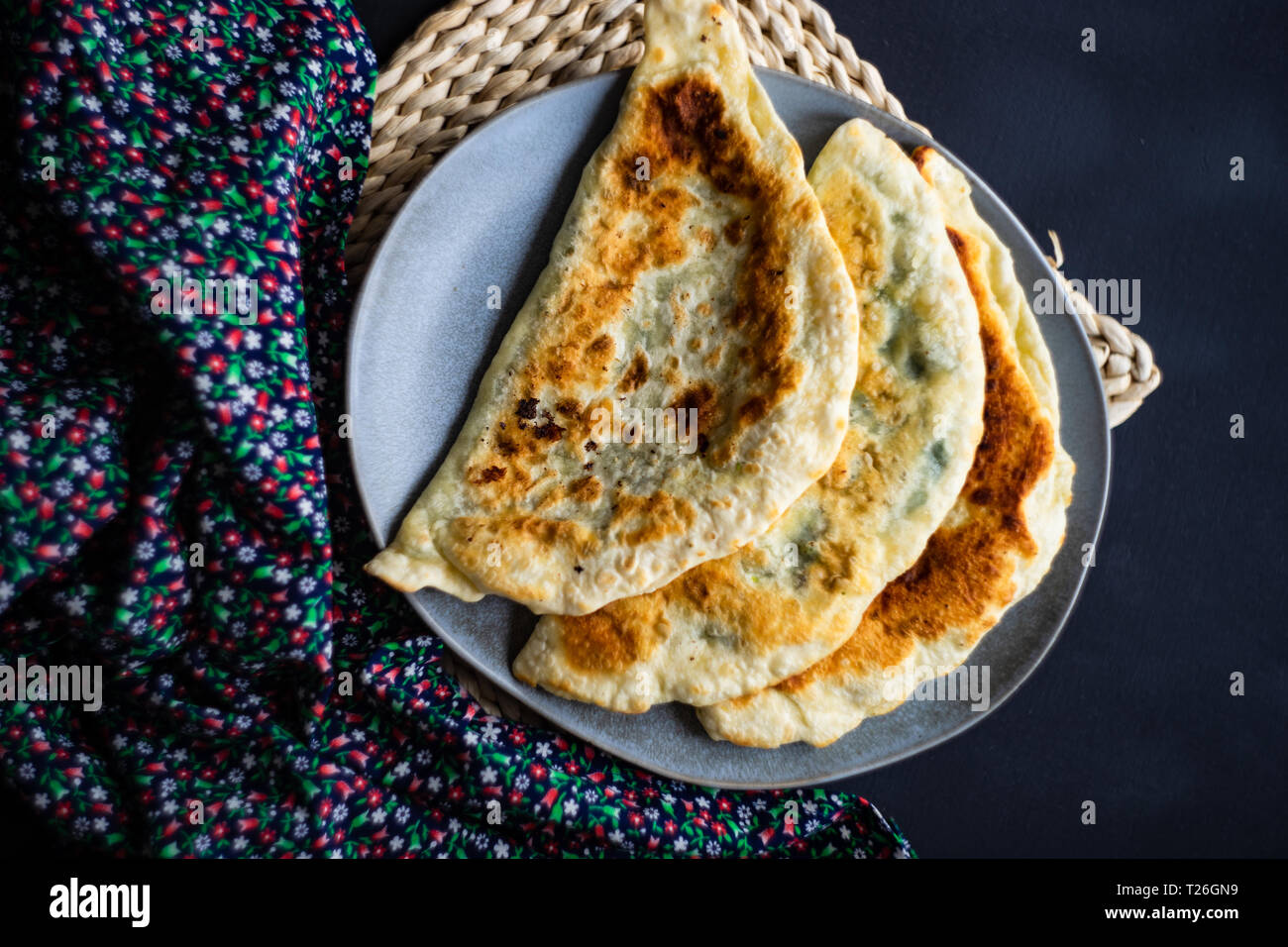 Traditional azerbaijan cuisine flat bread with herbs kutaby Stock Photo ...