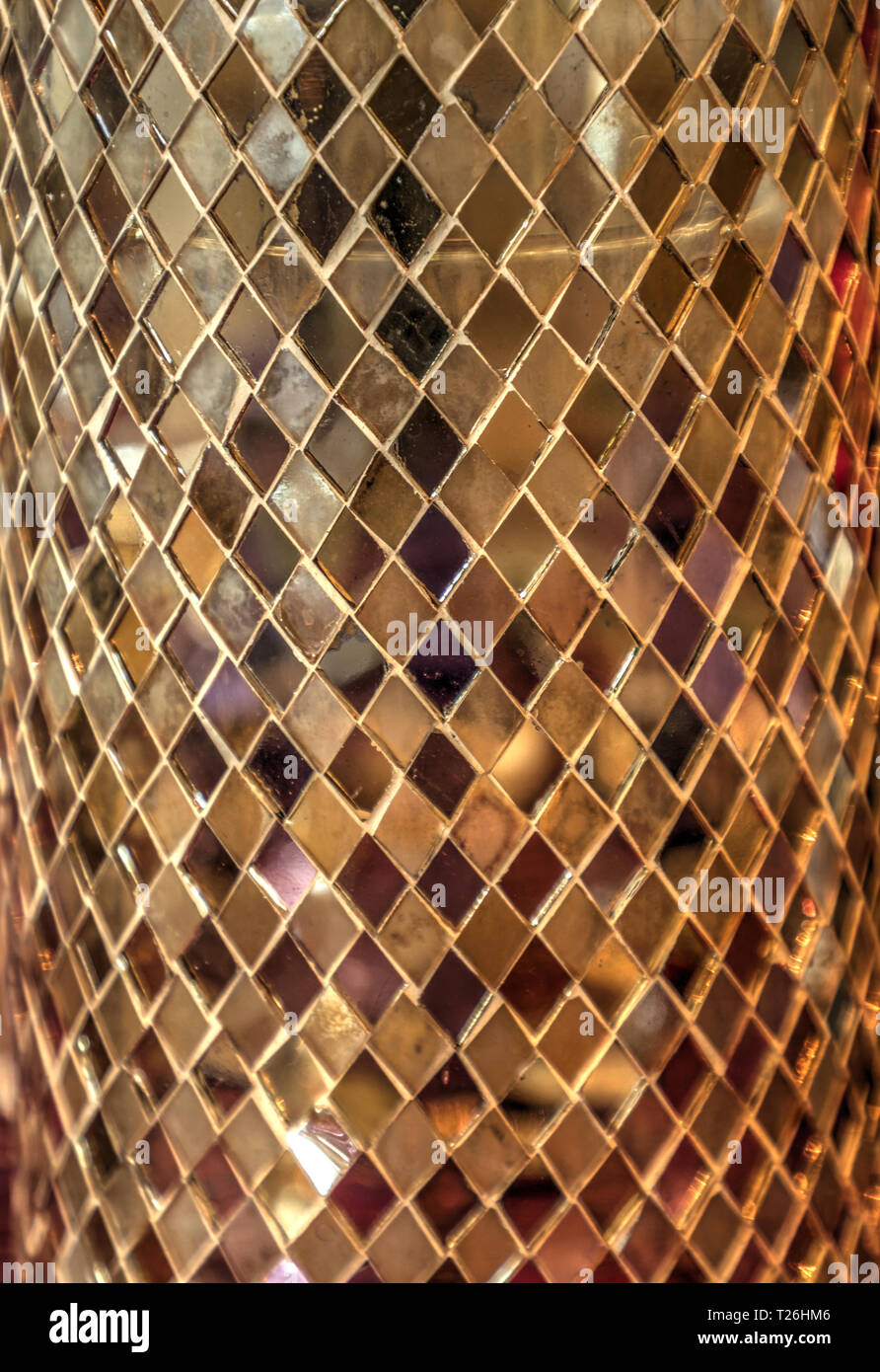Gold mirror background with the squares shaped into glittering diamonds ...