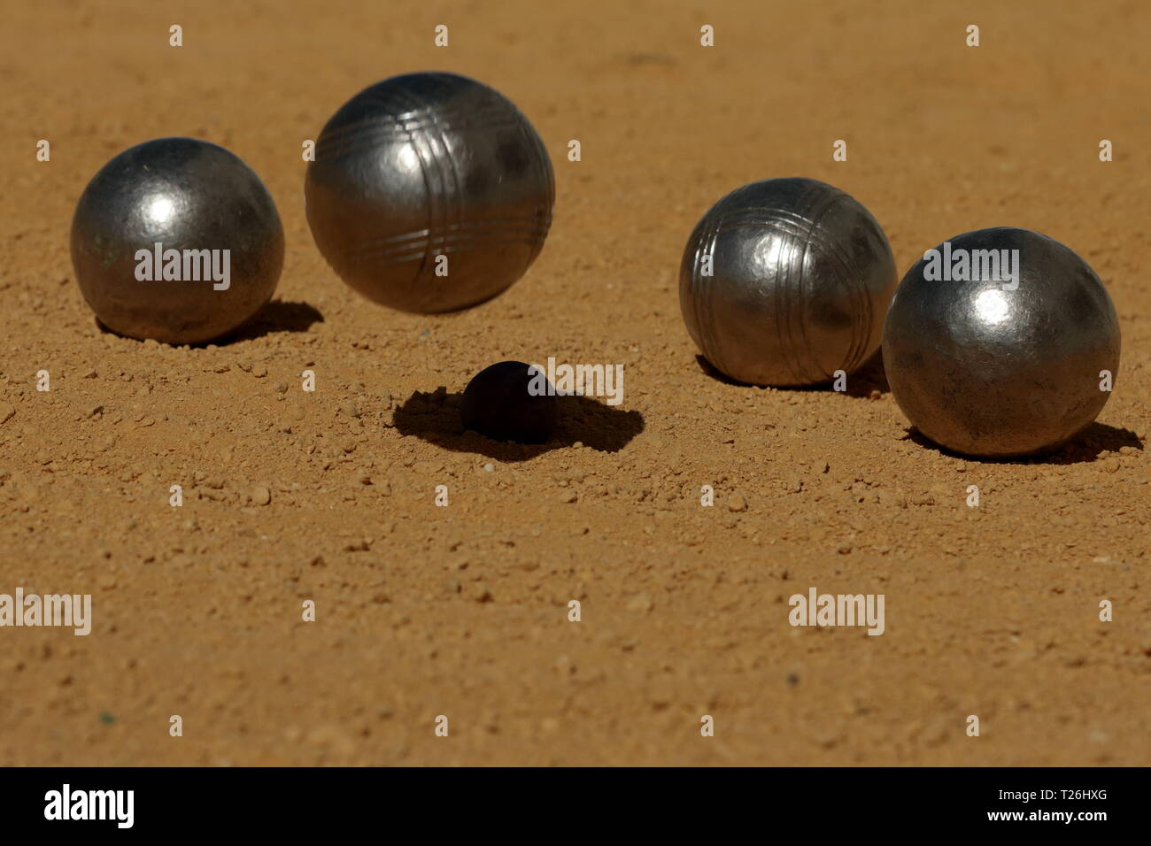 A solid stainless French steel boule is about to impact le but (the ...