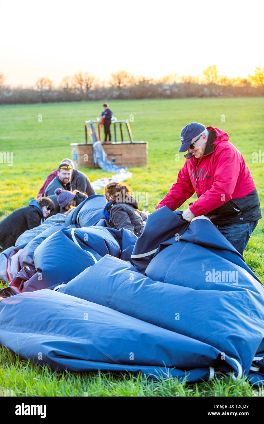 Hot air ballooning, Bristol. After an evening flight, the balloon once ...